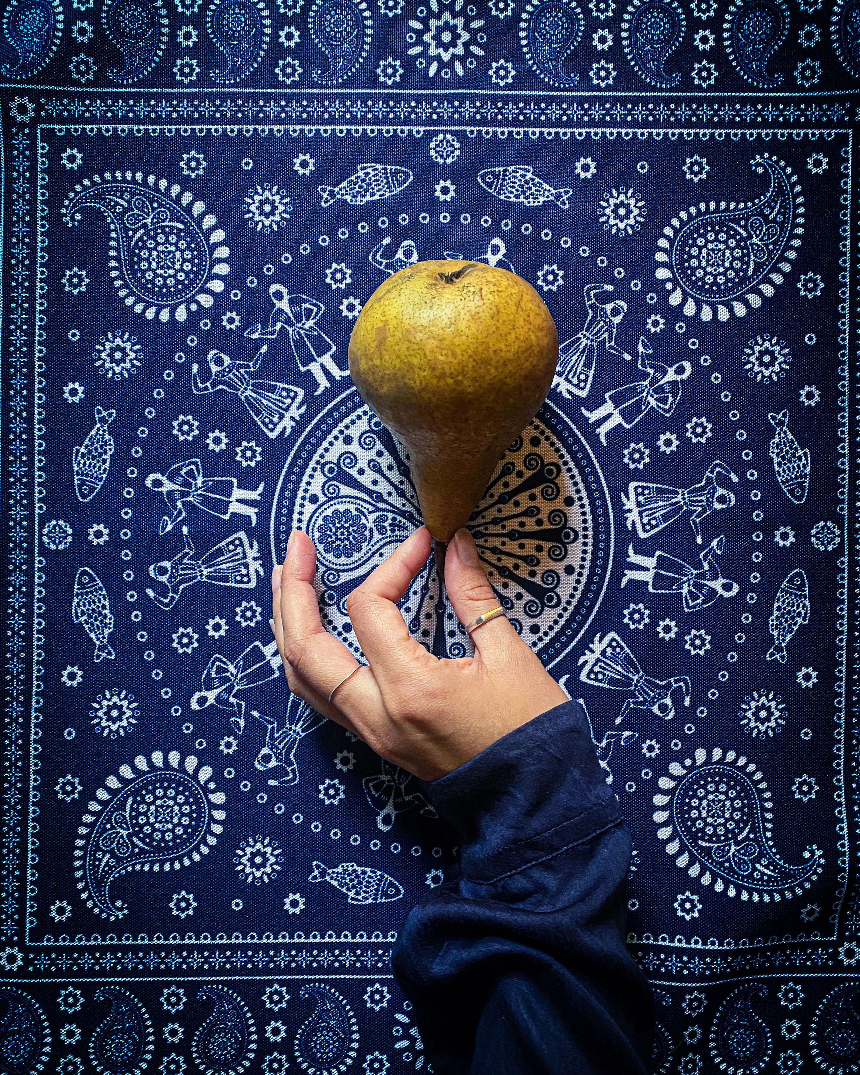 Pear on Blue Paisley: A Quiet Centerpiece