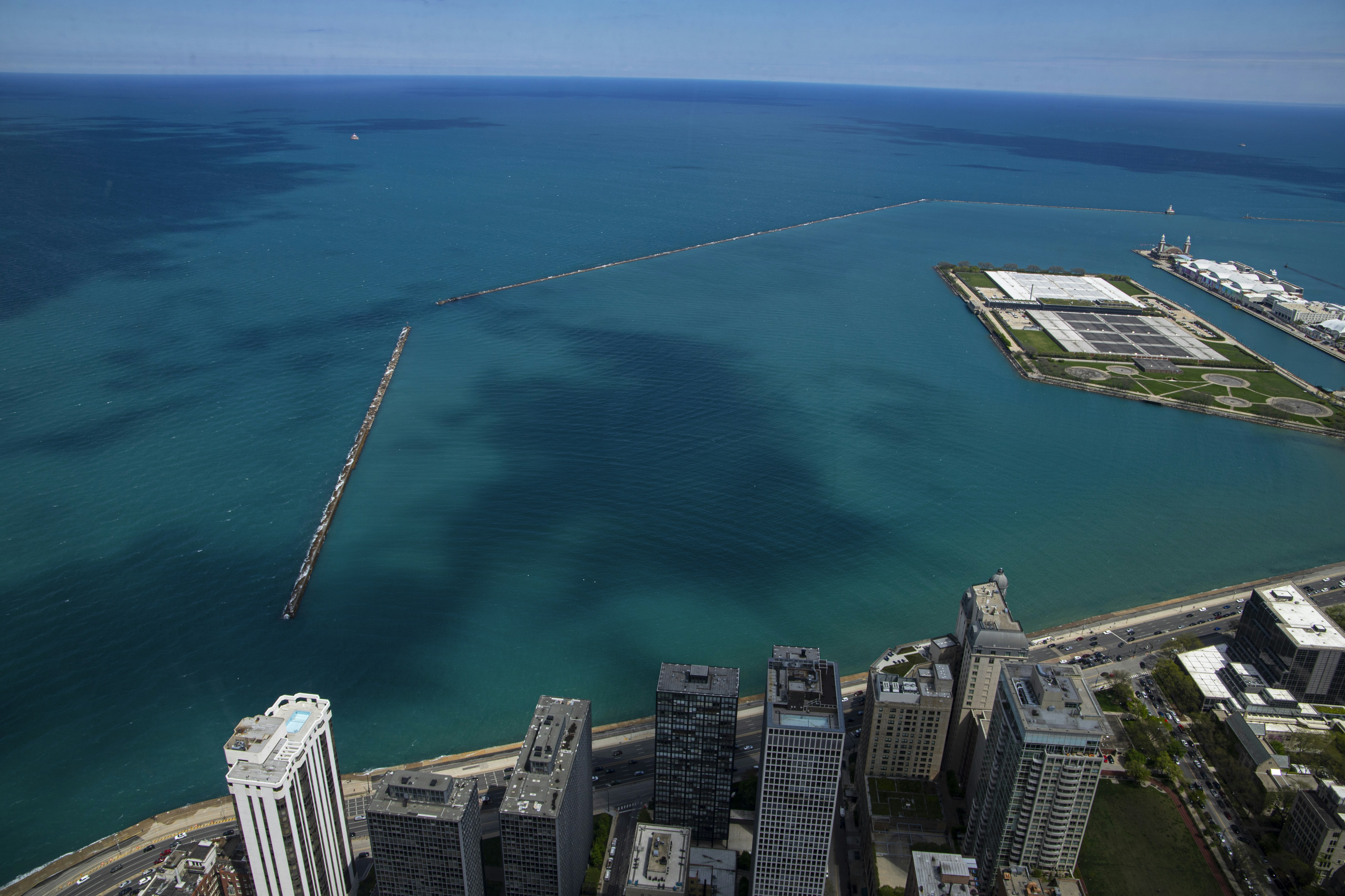 Harbor Edge: Urban Coastline Dives into Turquoise Waters