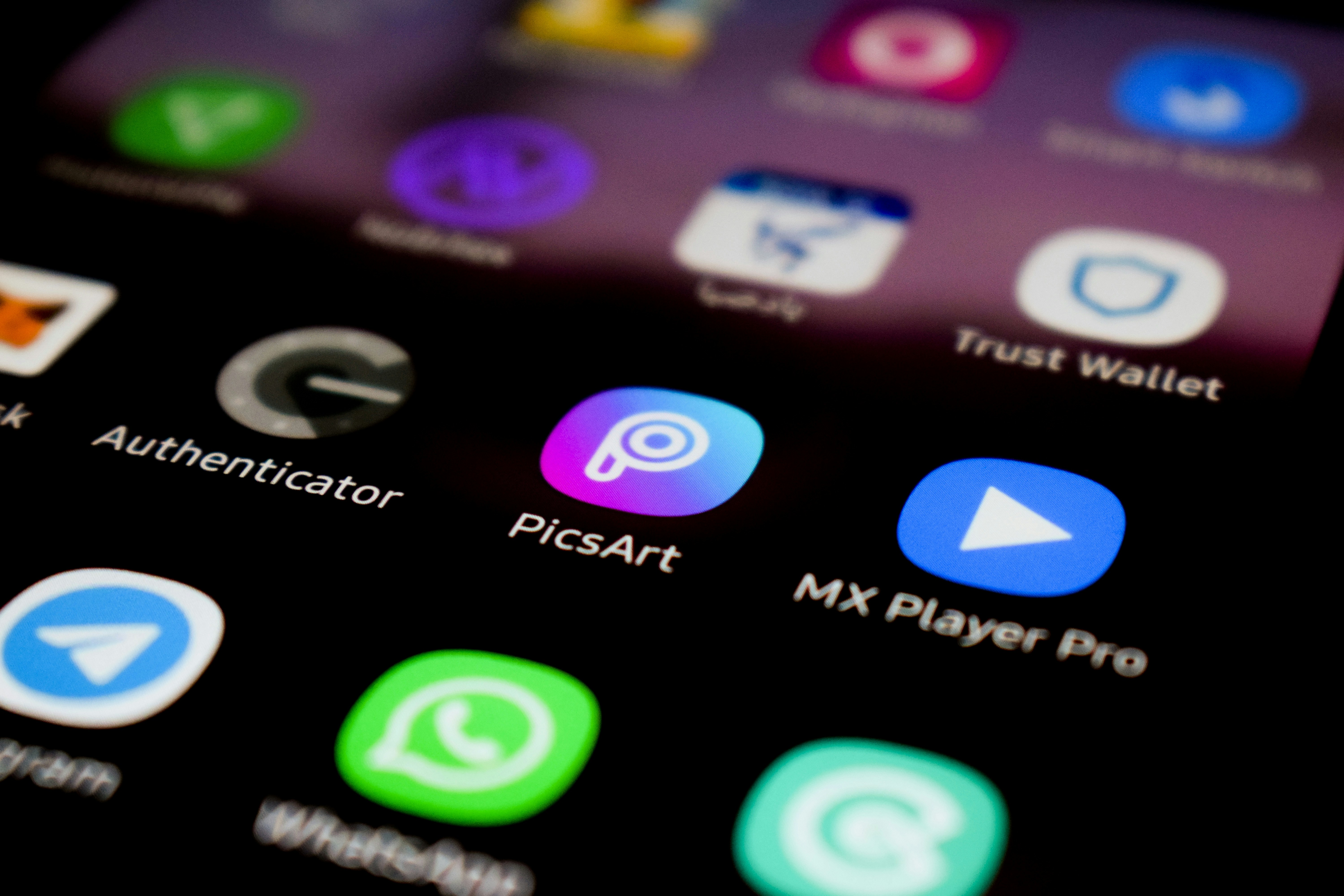 A close up of a cell phone with different app icons photo – Free ...