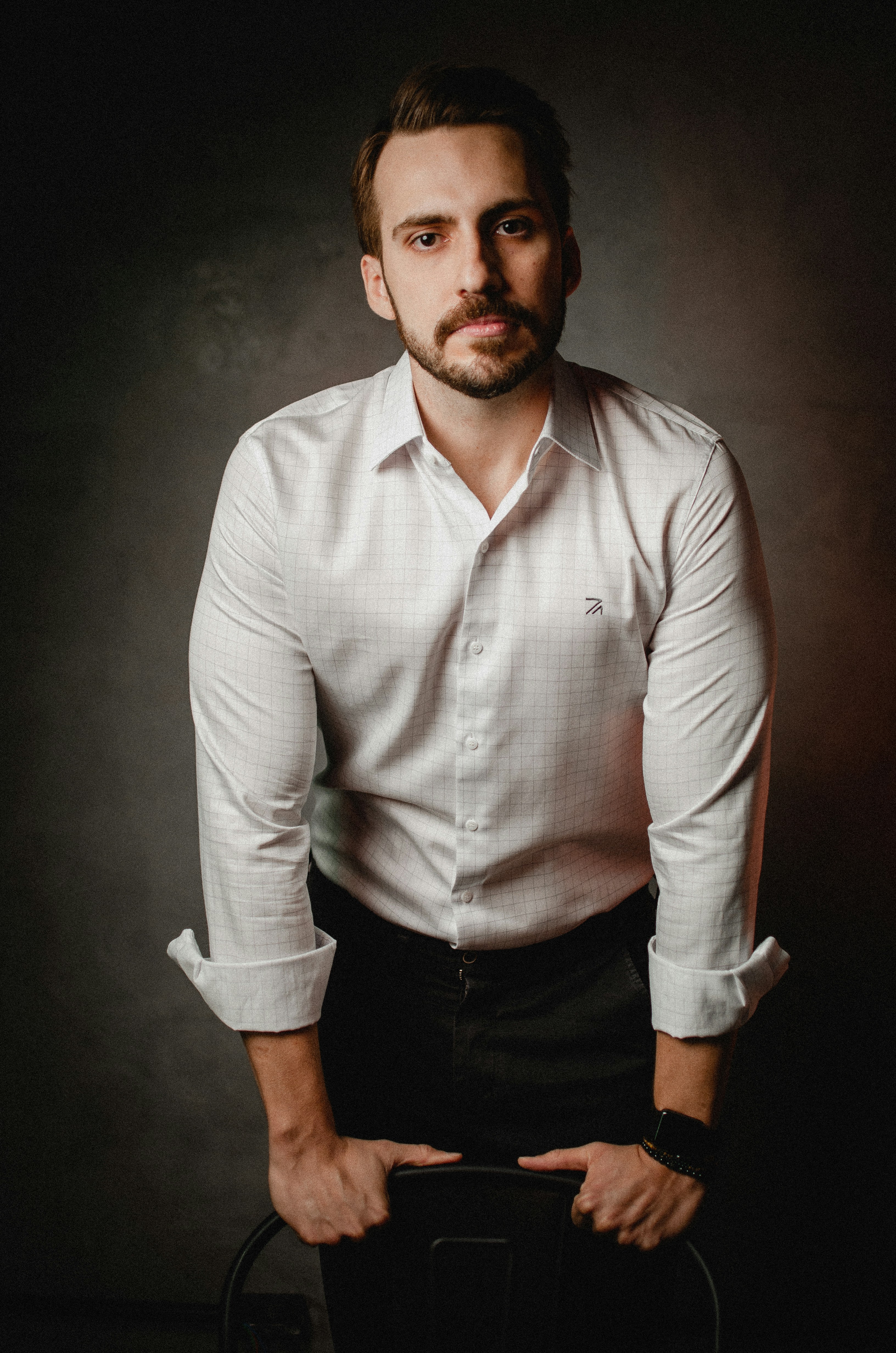 A man in a white shirt and black pants photo – Free Person Image on ...