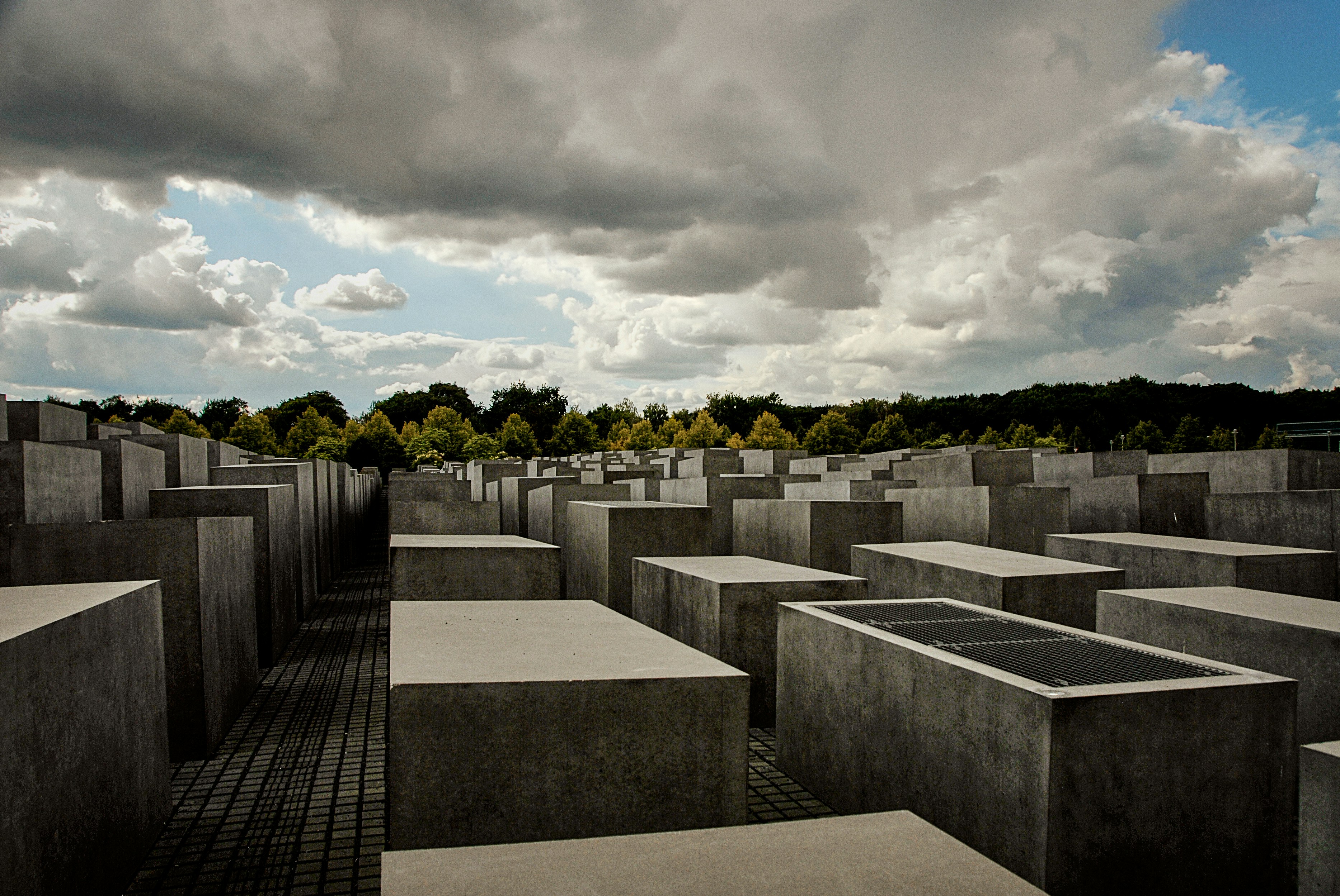 A bunch of concrete blocks sitting in a field photo – Free Monument ...