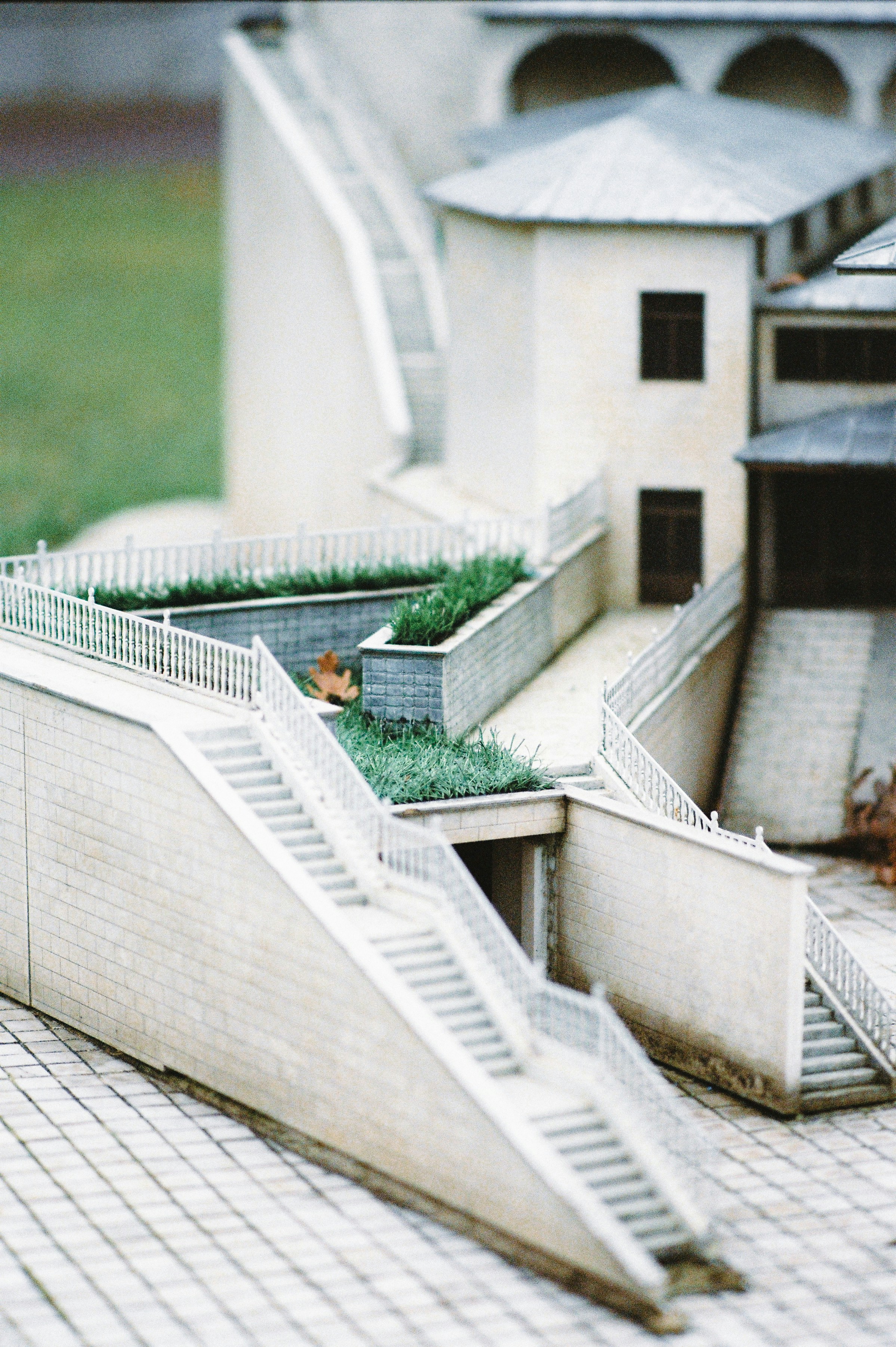 Intricate Stairs in a Sunlit Miniature Courtyard