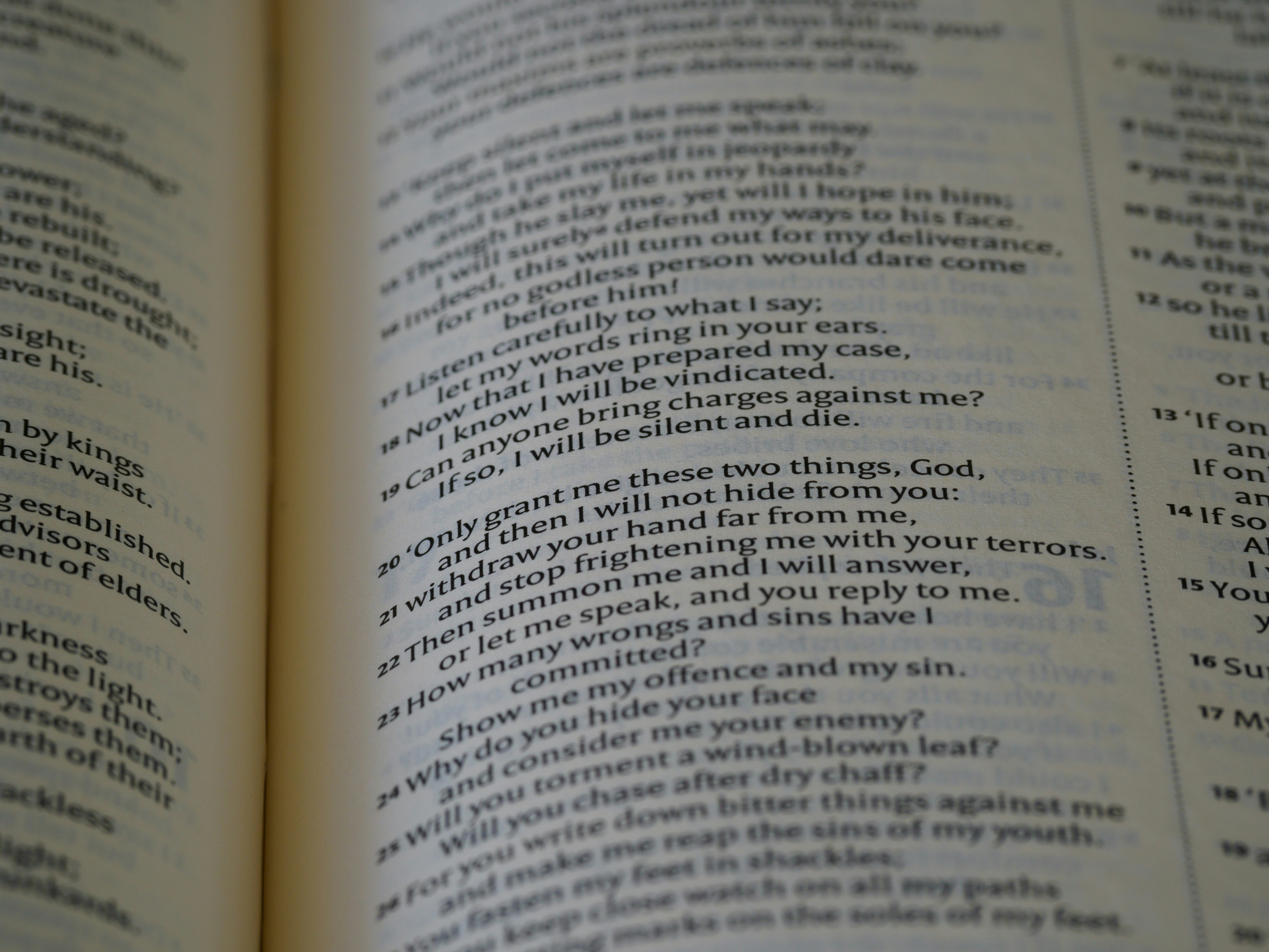 A close up of an open book with words on it photo – Free Grey Image on ...