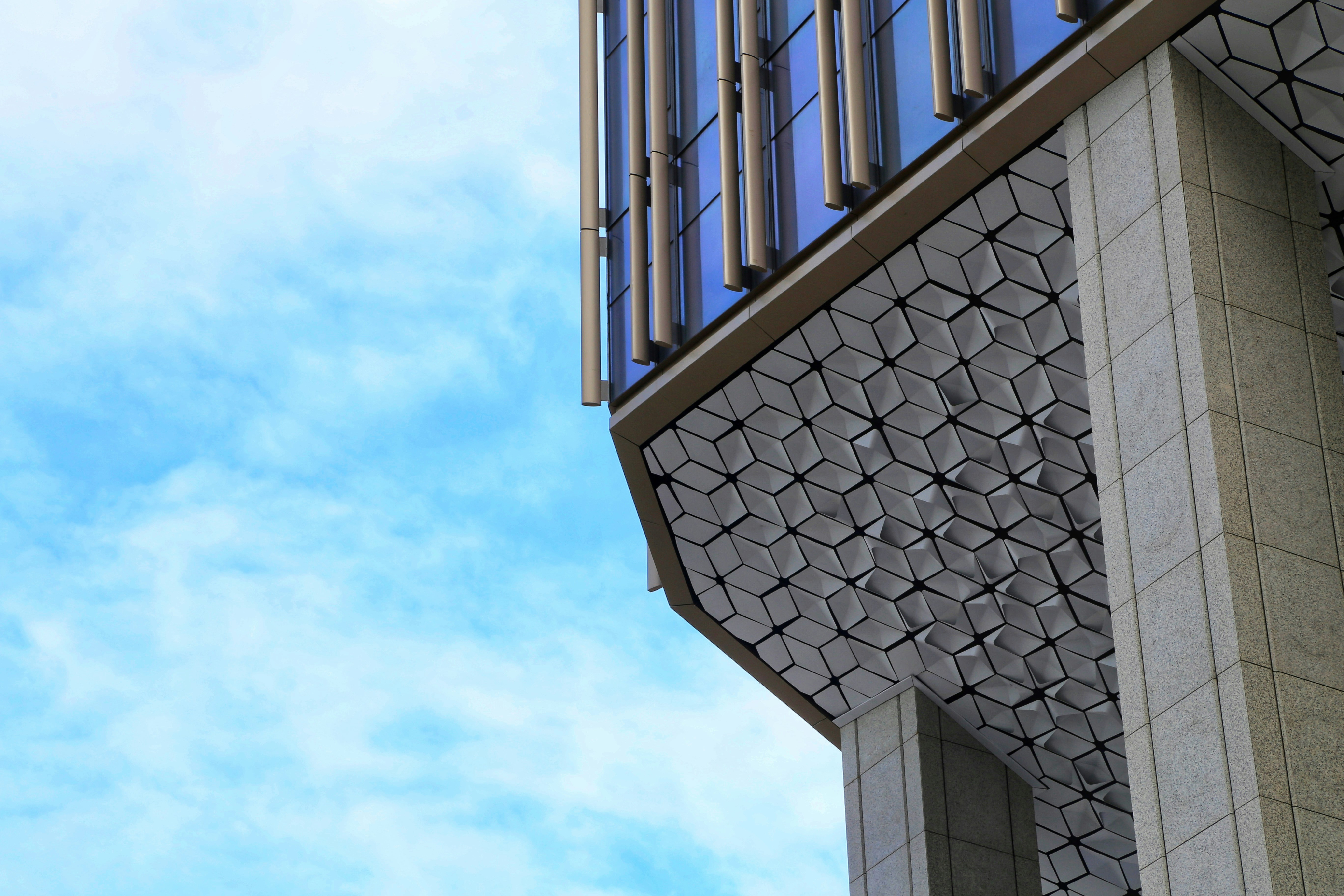 Hexagonal Facade Edge Over a Cerulean Sky