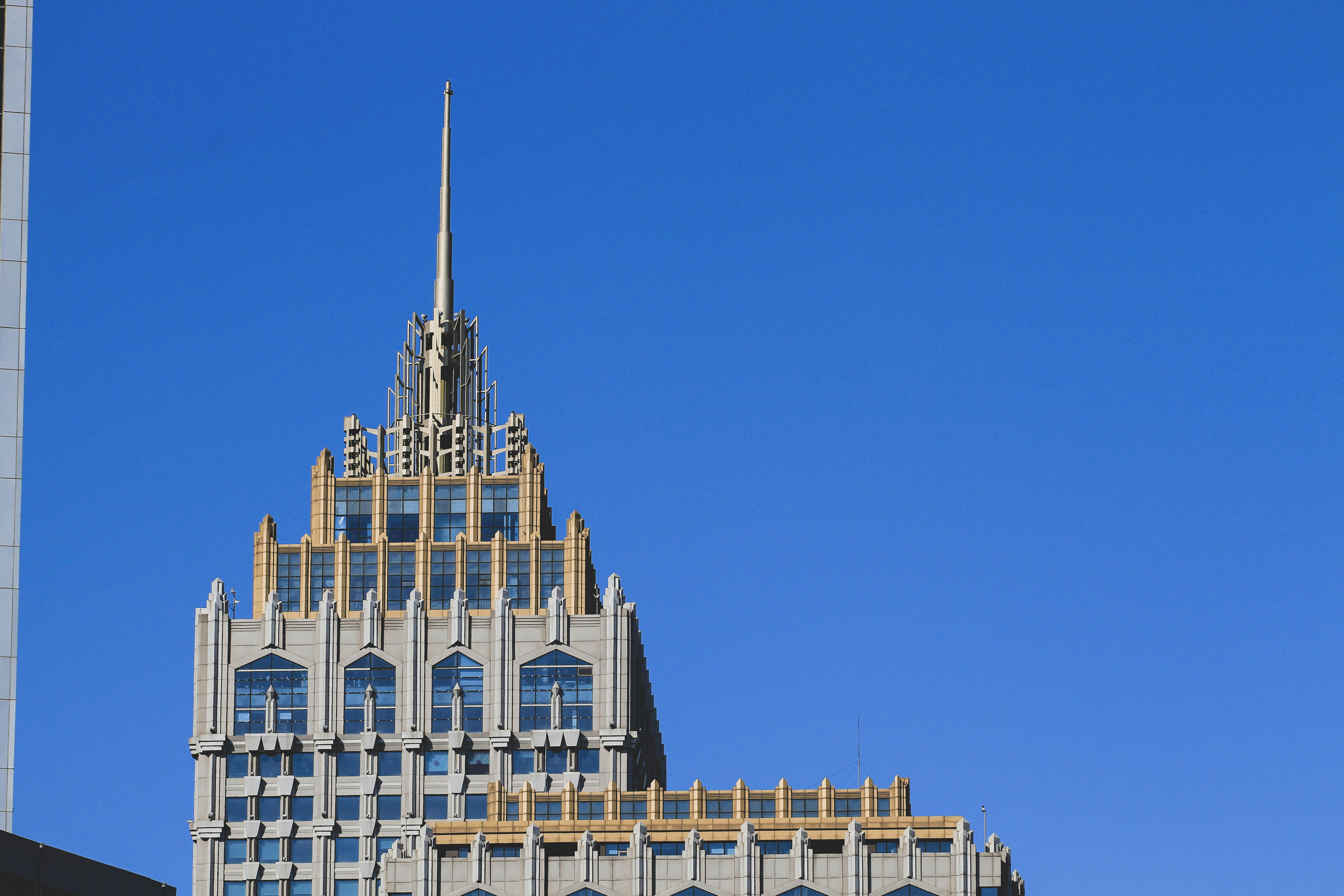 A very tall building with a clock on it's side photo – Free 辽宁省沈阳市 ...