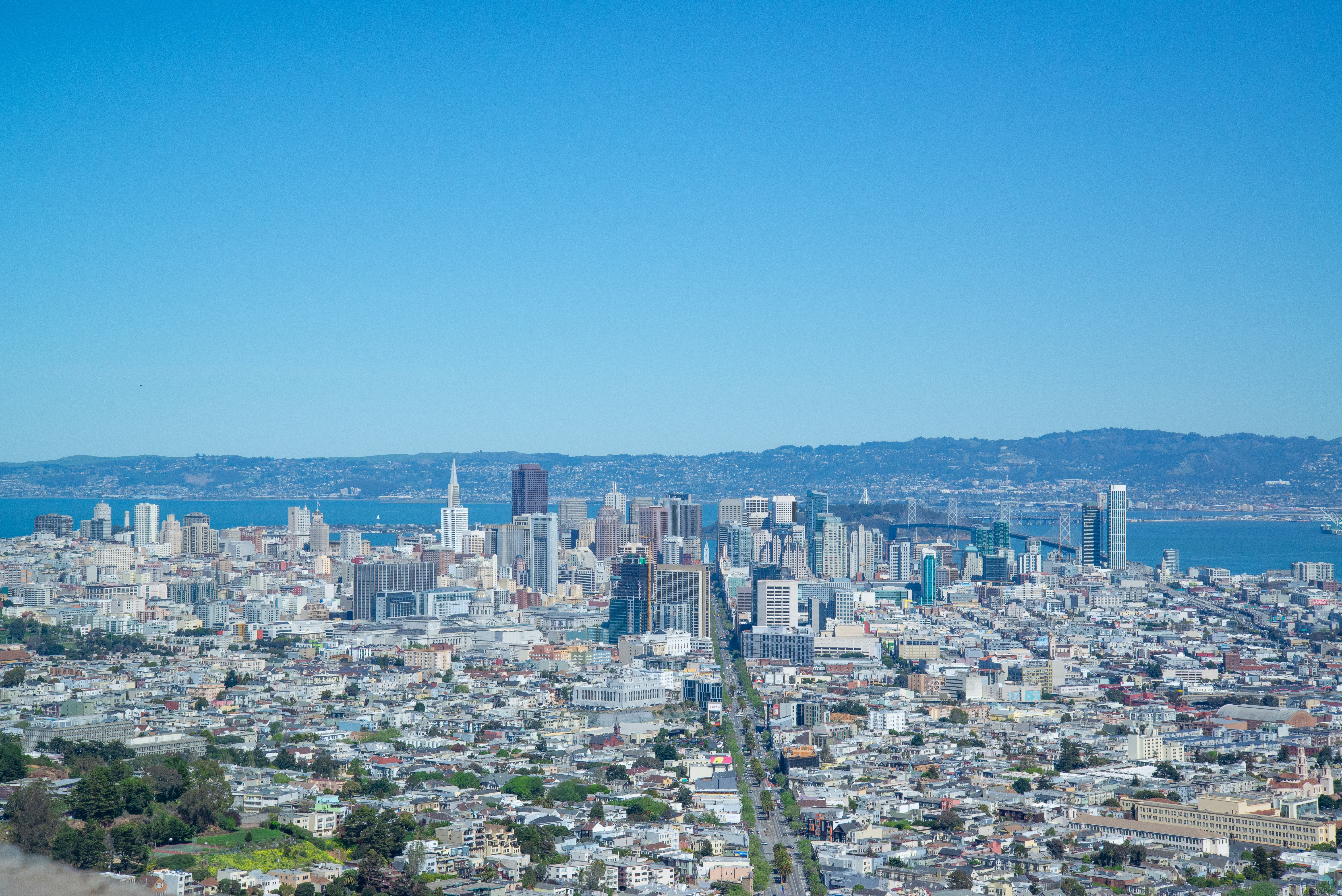 A view of a city from the top of a hill photo – Free Twin peaks Image ...
