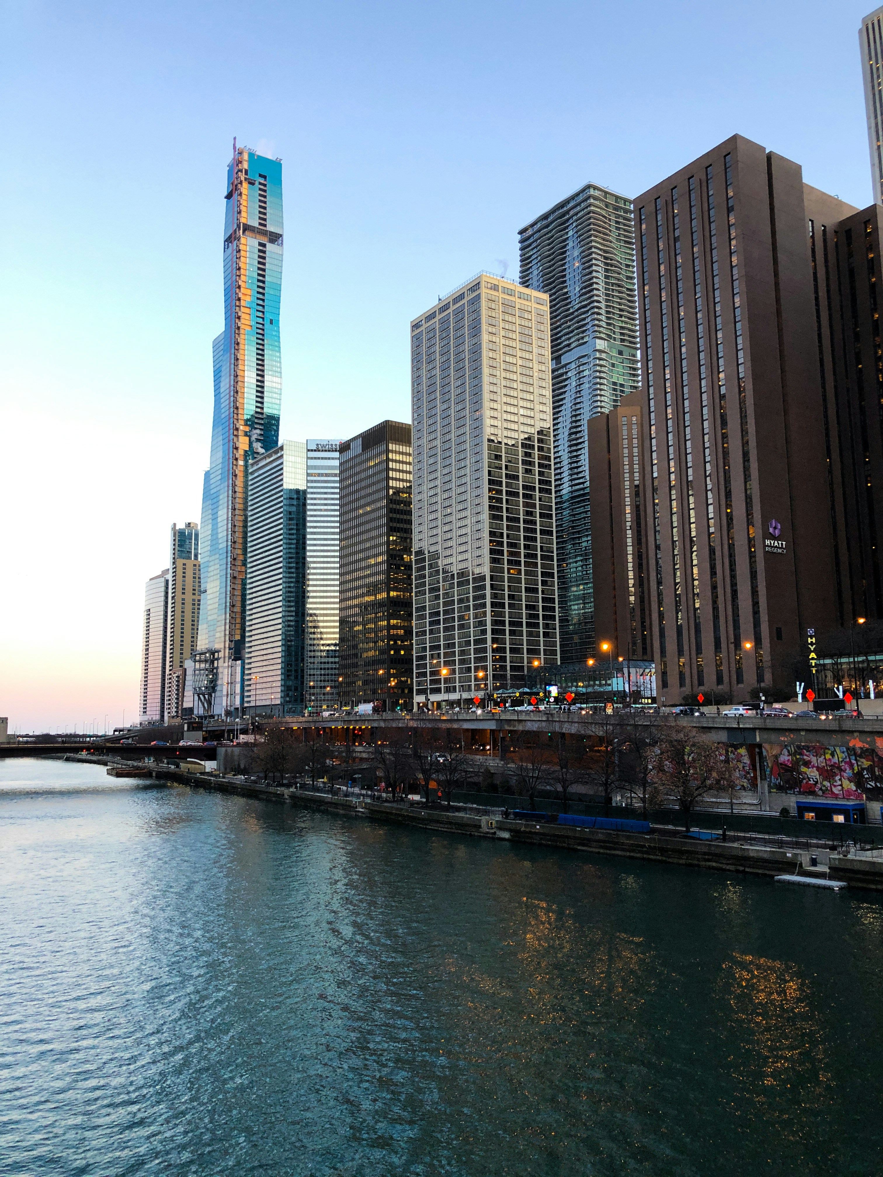 Toward the Skyline: Glass, Water, and City Light