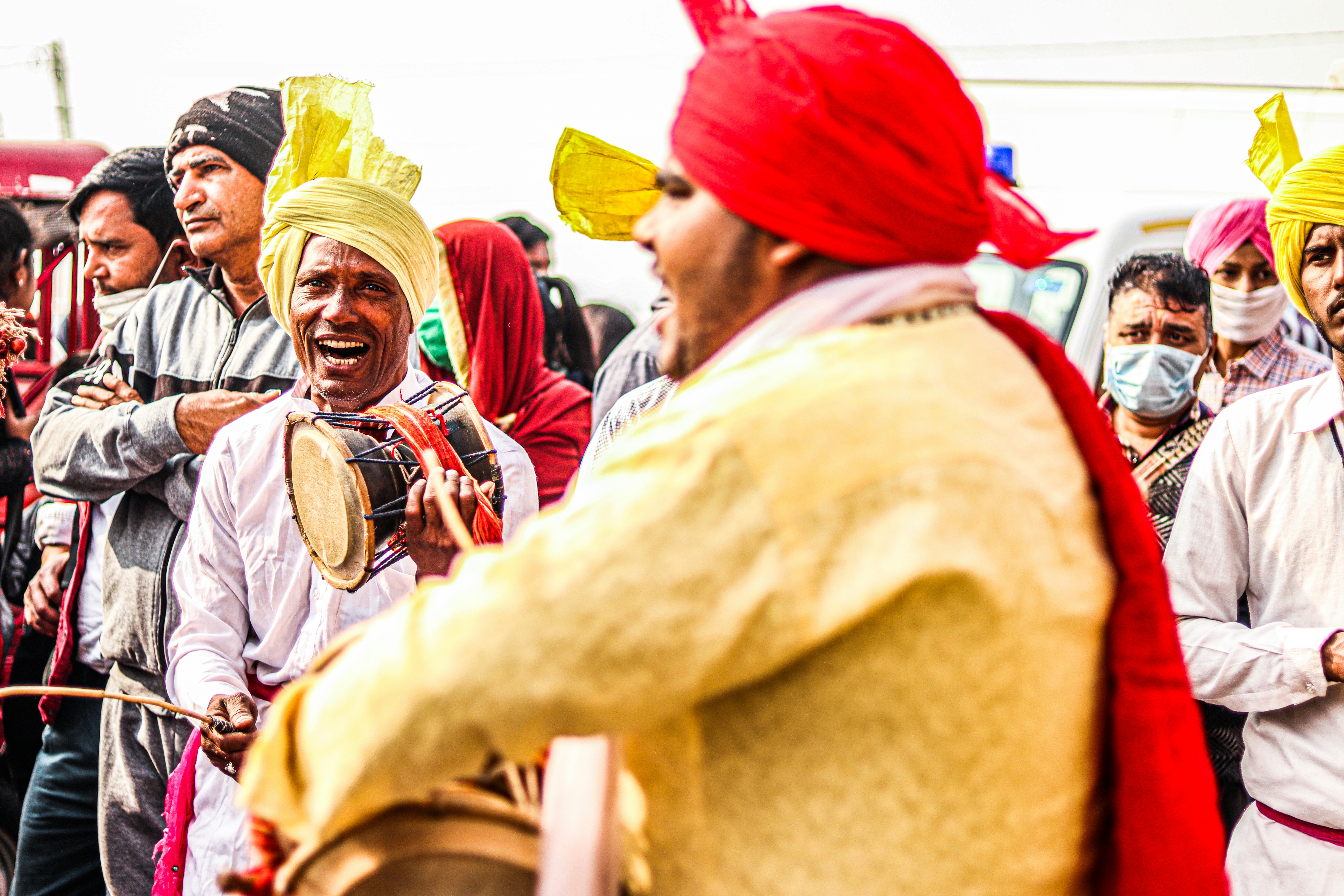 A group of men in colorful turbans and head coverings photo – Free ...