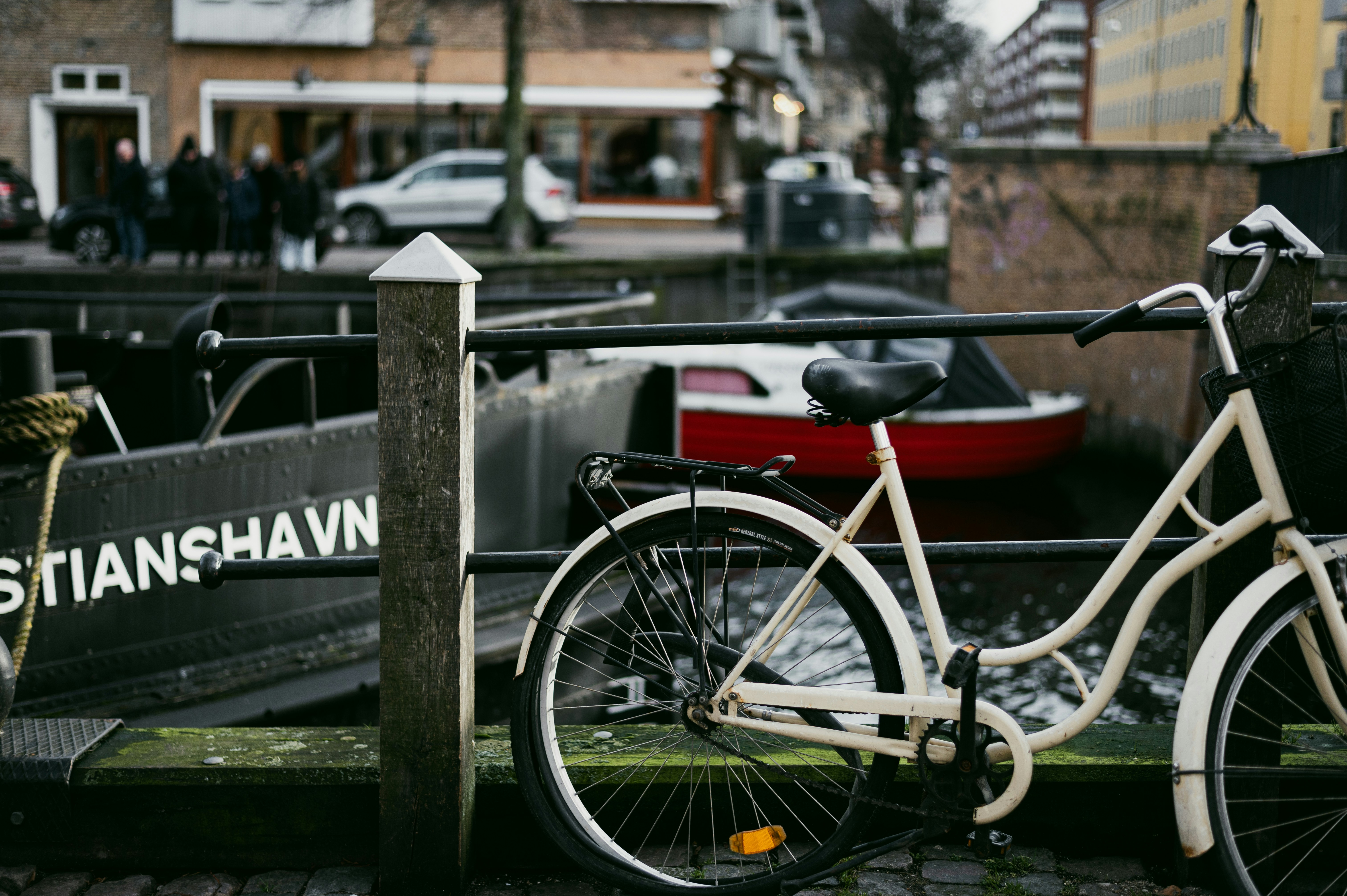 Pastel Bicycle by the Canal: Quietness in a Dutch-tinged Calle