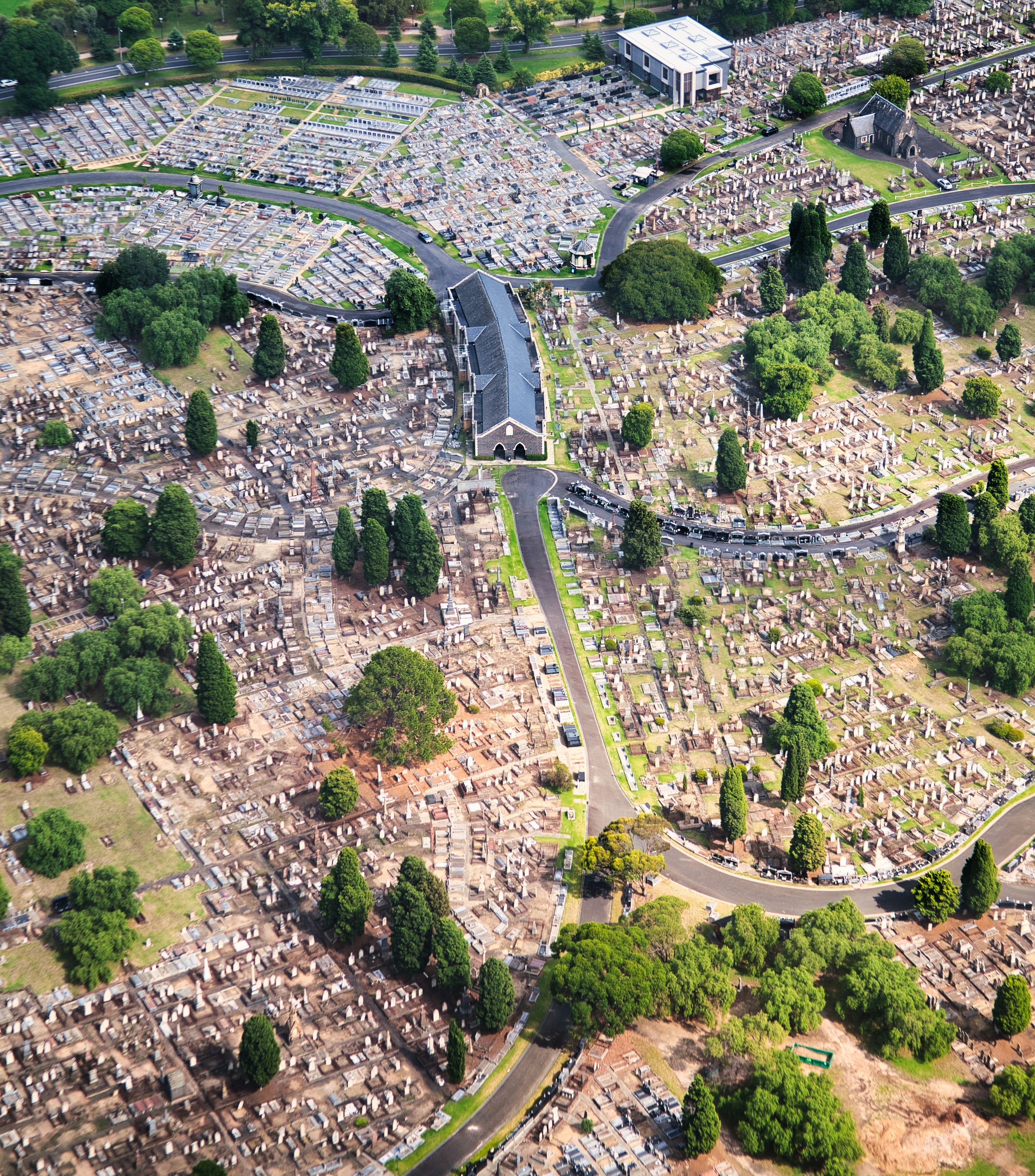 A bird's eye view of a large cemetery photo – Free Cemetery road east ...