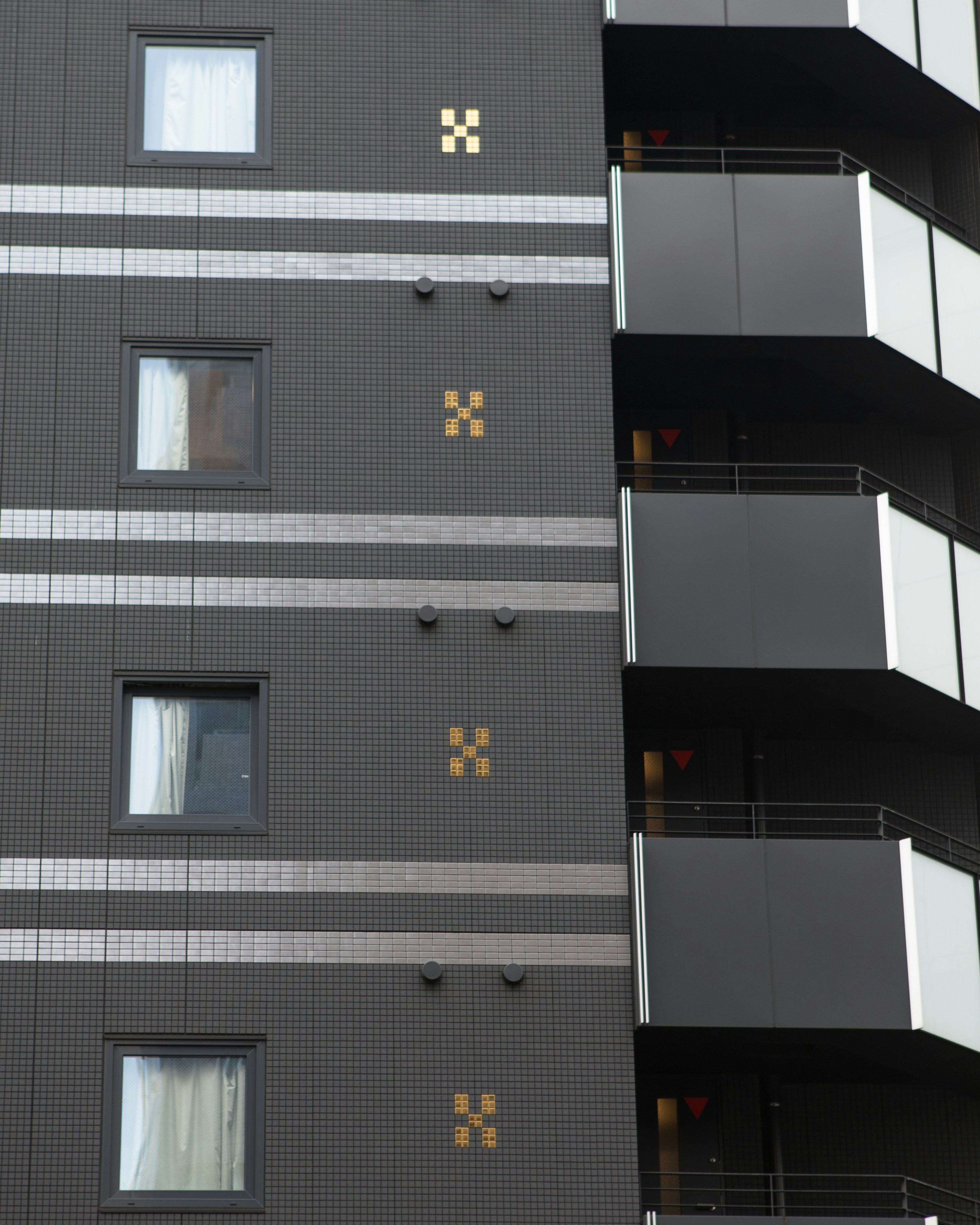 Golden X Motifs Thread a Modern Facade