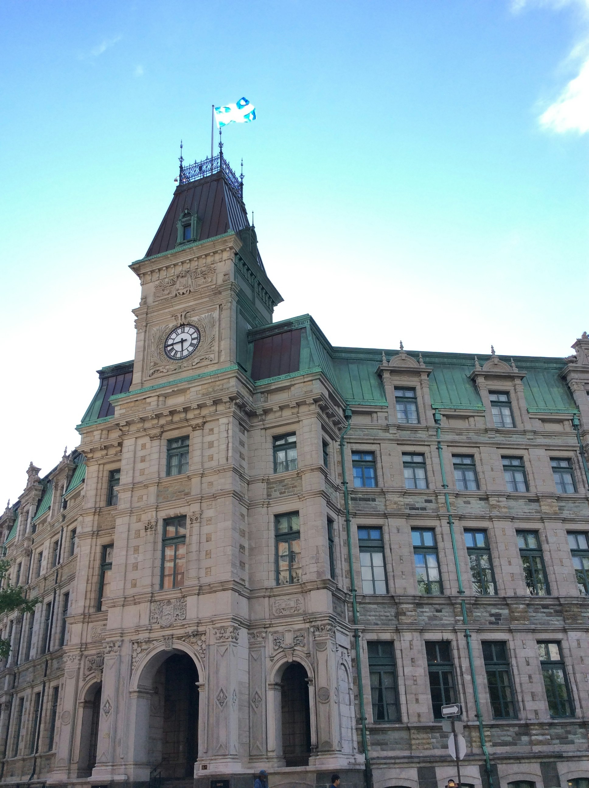 a large building with a clock on the top of it