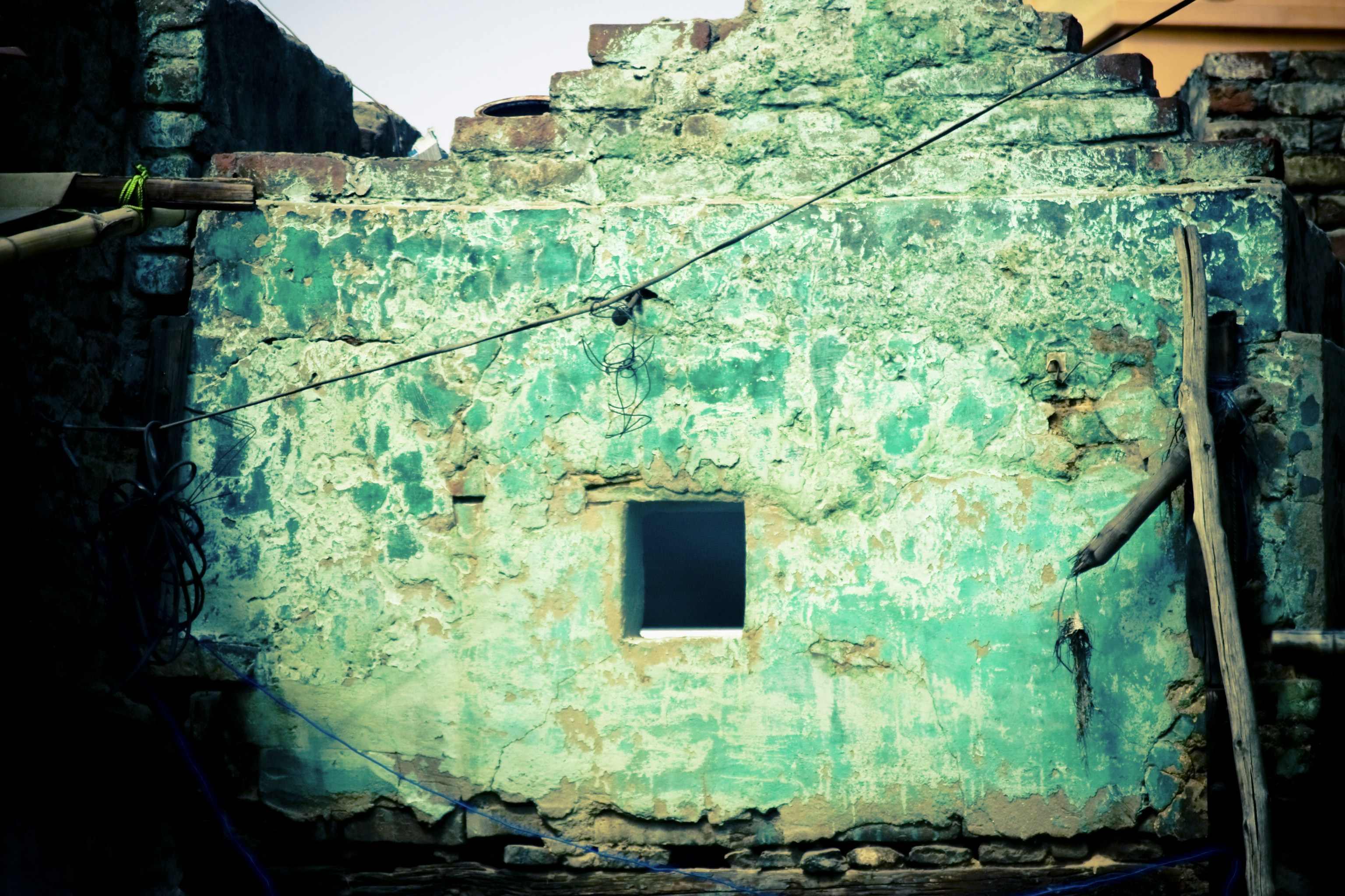 An old green building with a small window photo – Free Индия Image on ...