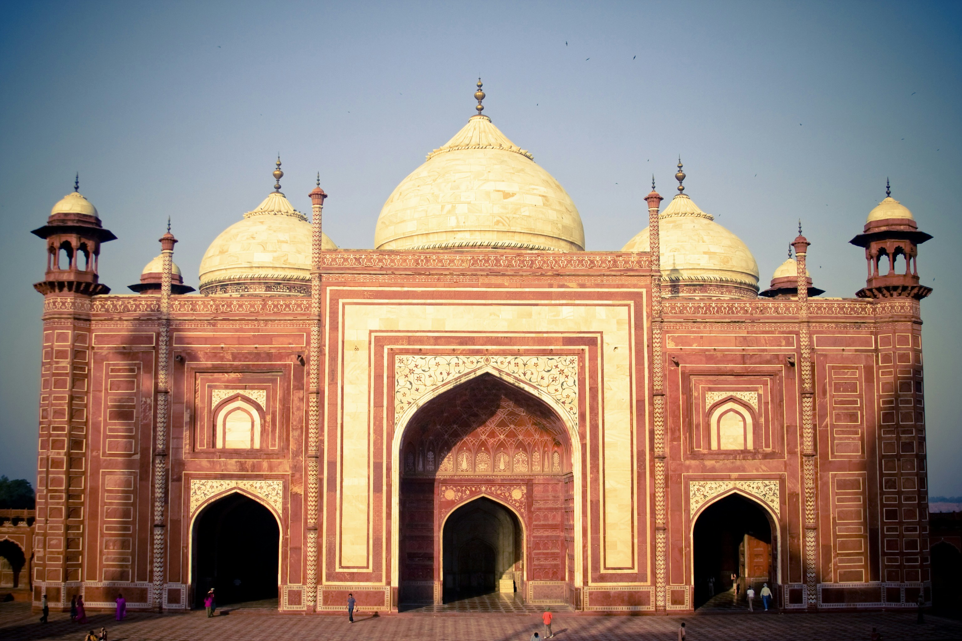 A large brick building with arches and domes photo – Free Taj mahal ...
