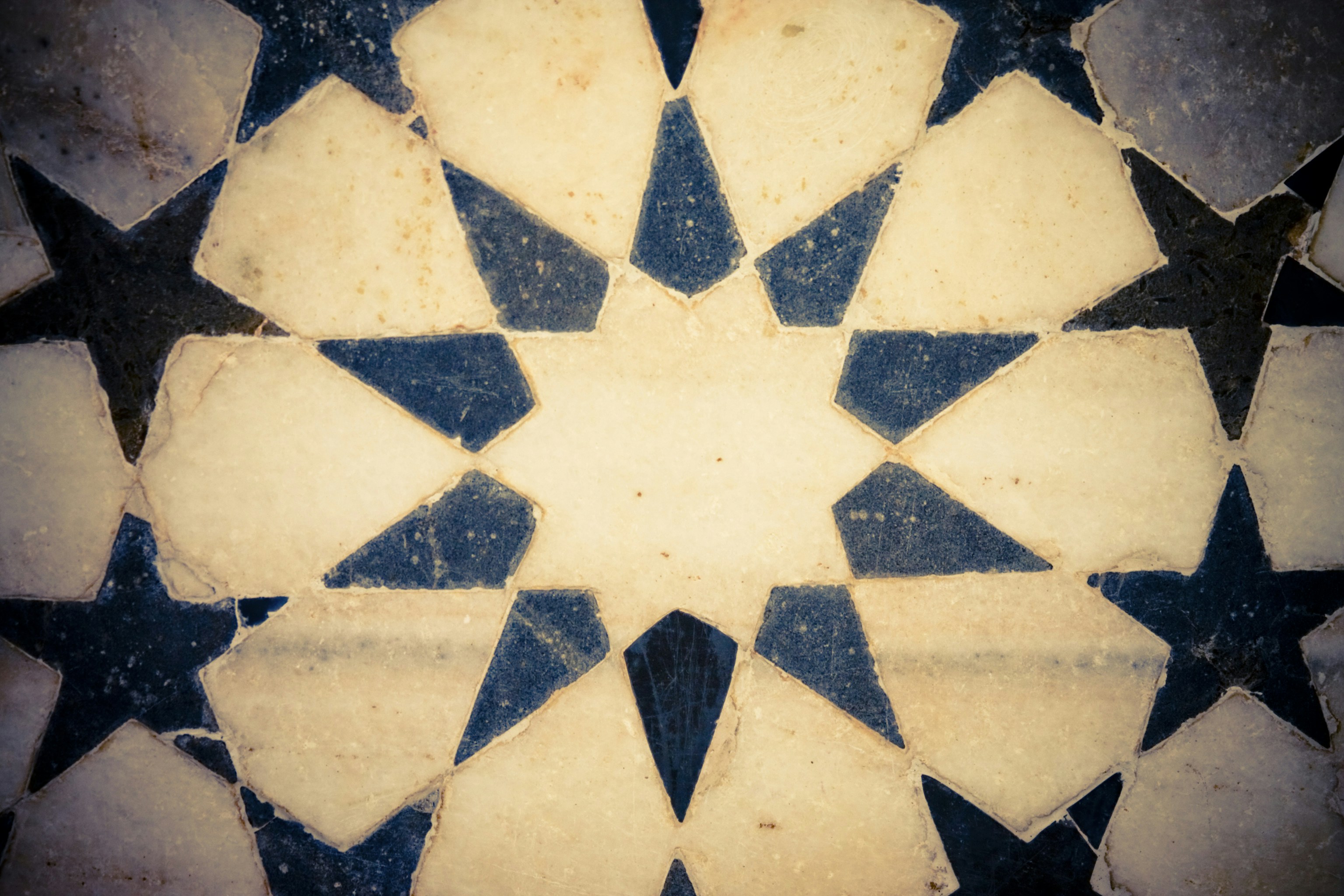 A black and white star pattern on a tile floor photo – Free Уттар ...