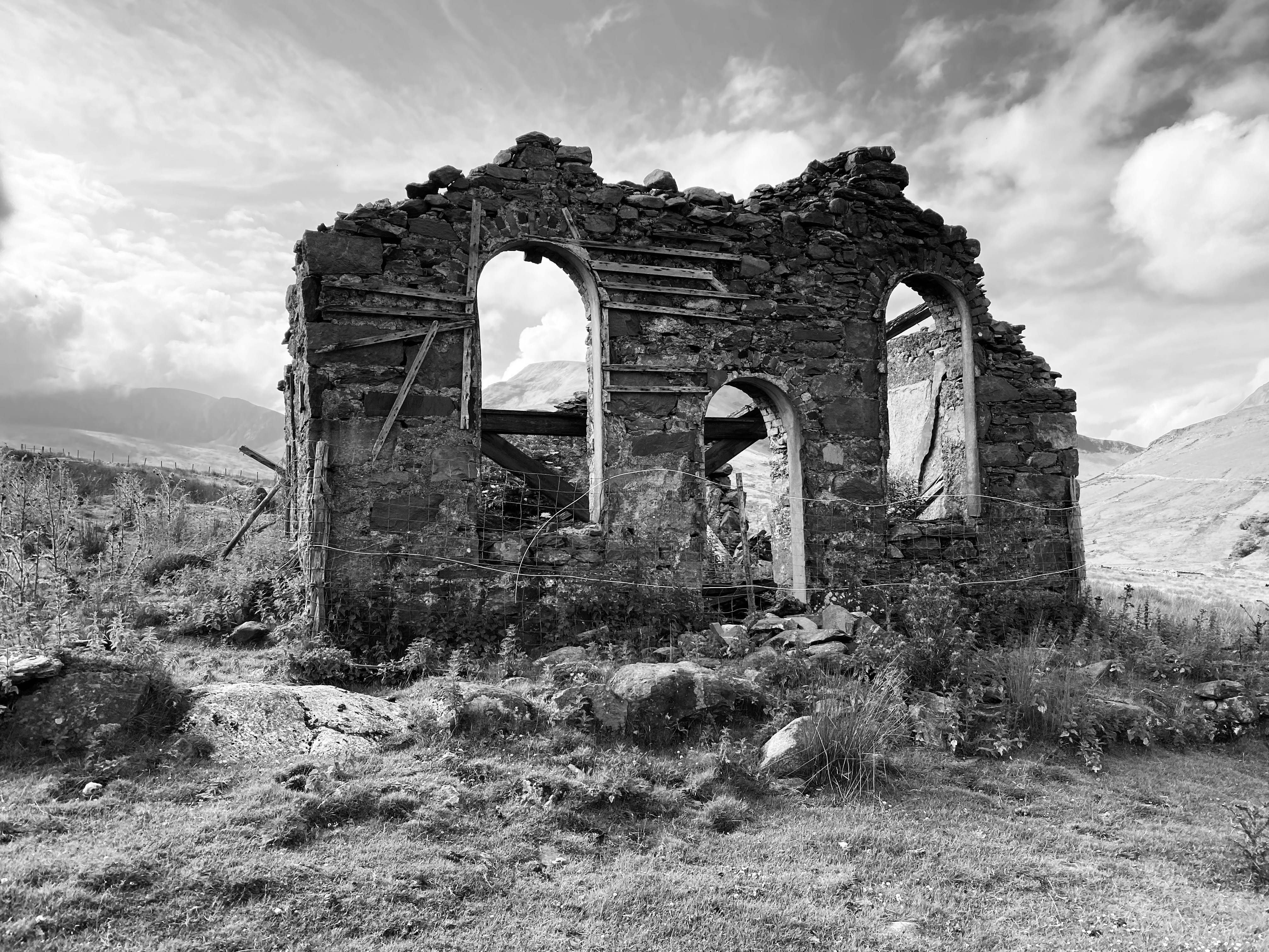 Echoes Through Weathered Arches on a Wind-Swept Plain