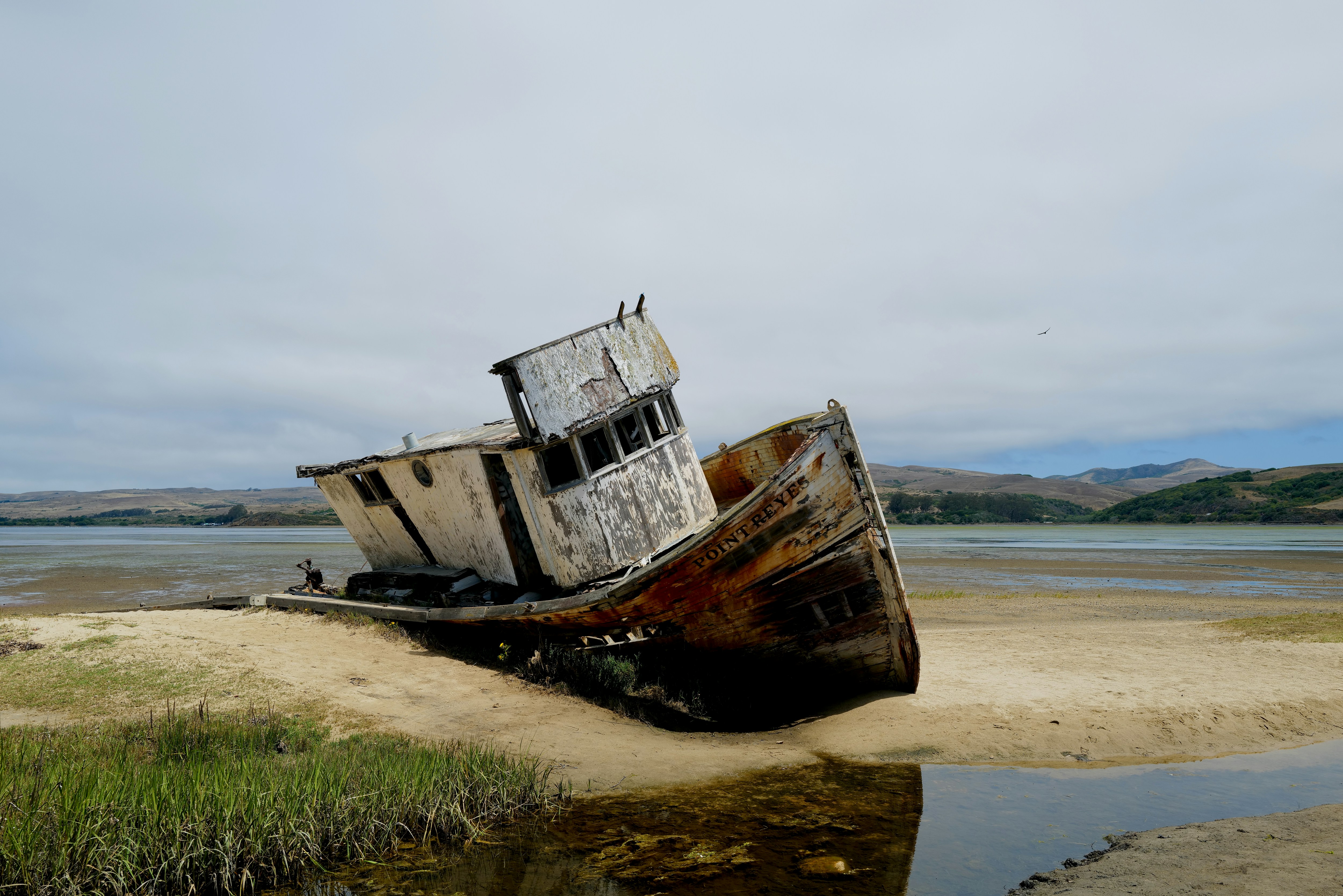Ghost Vessel Adrift on a Quiet Shore