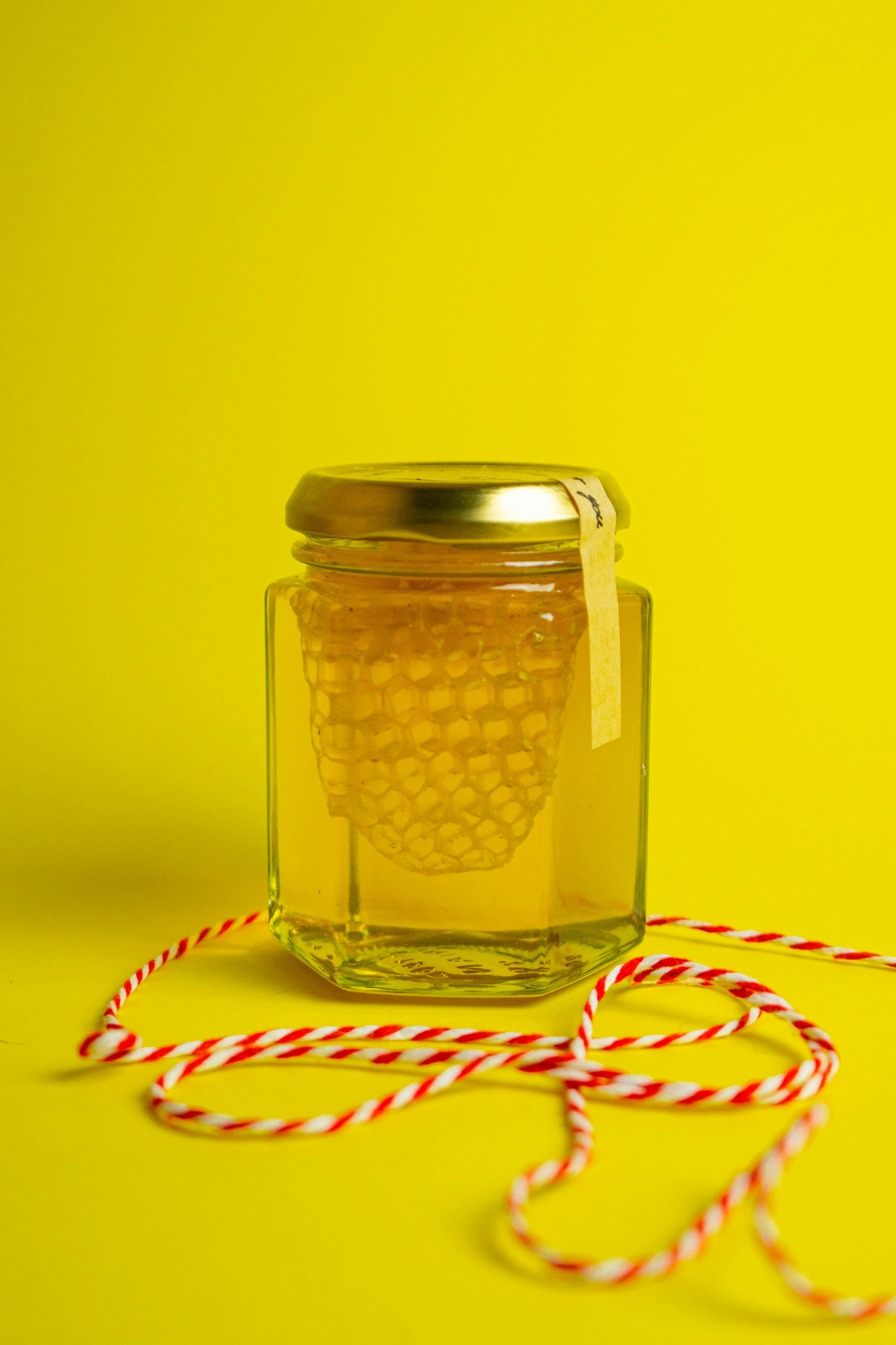 Amber Honey Jar on a Canary Yellow Studio Backdrop