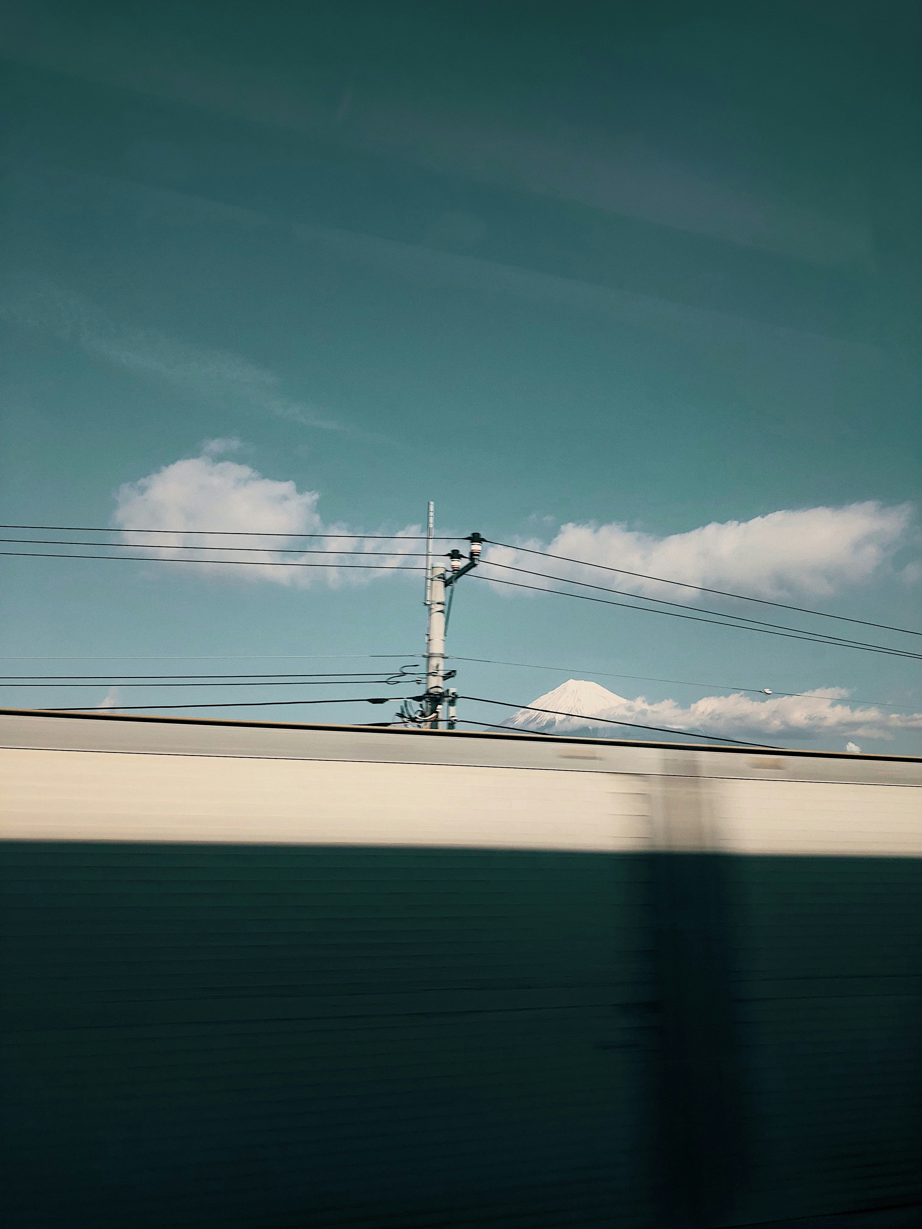 a blurry photo of power lines in the sky