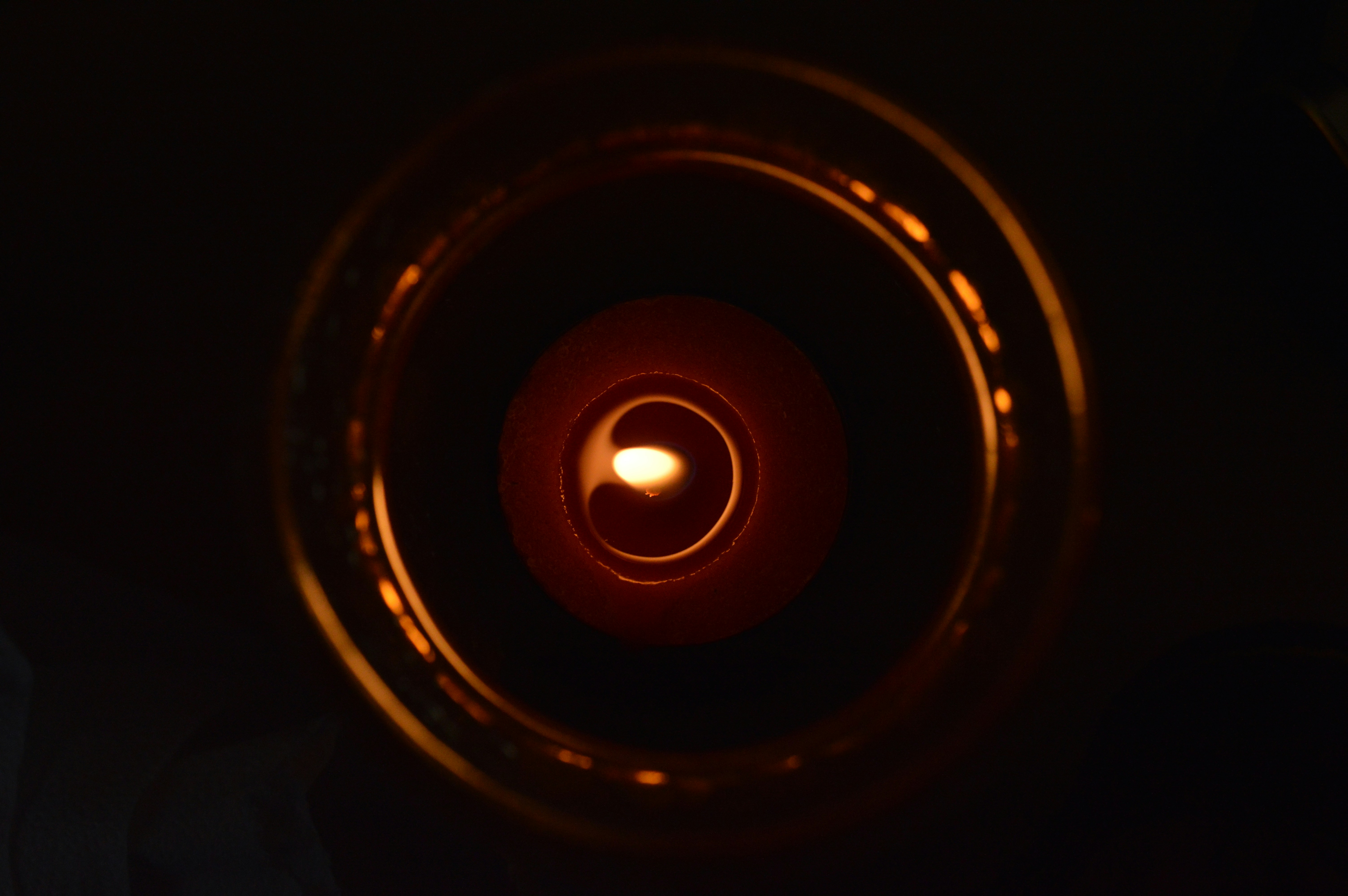 Ember Ring: A Macro Glimpse Into a Backlit Lens Aperture