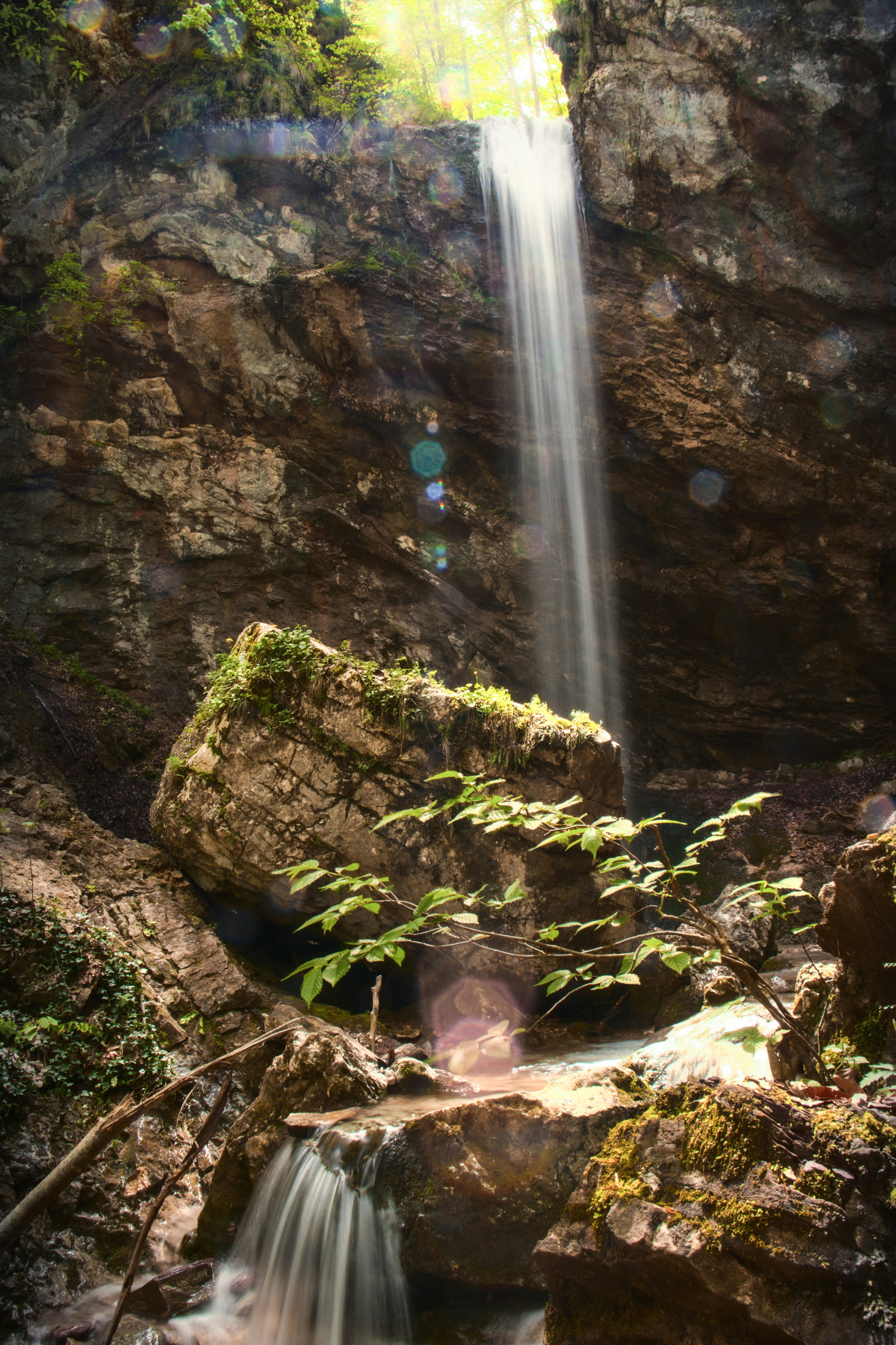Whispering Cascade Between Mossy Cliffs