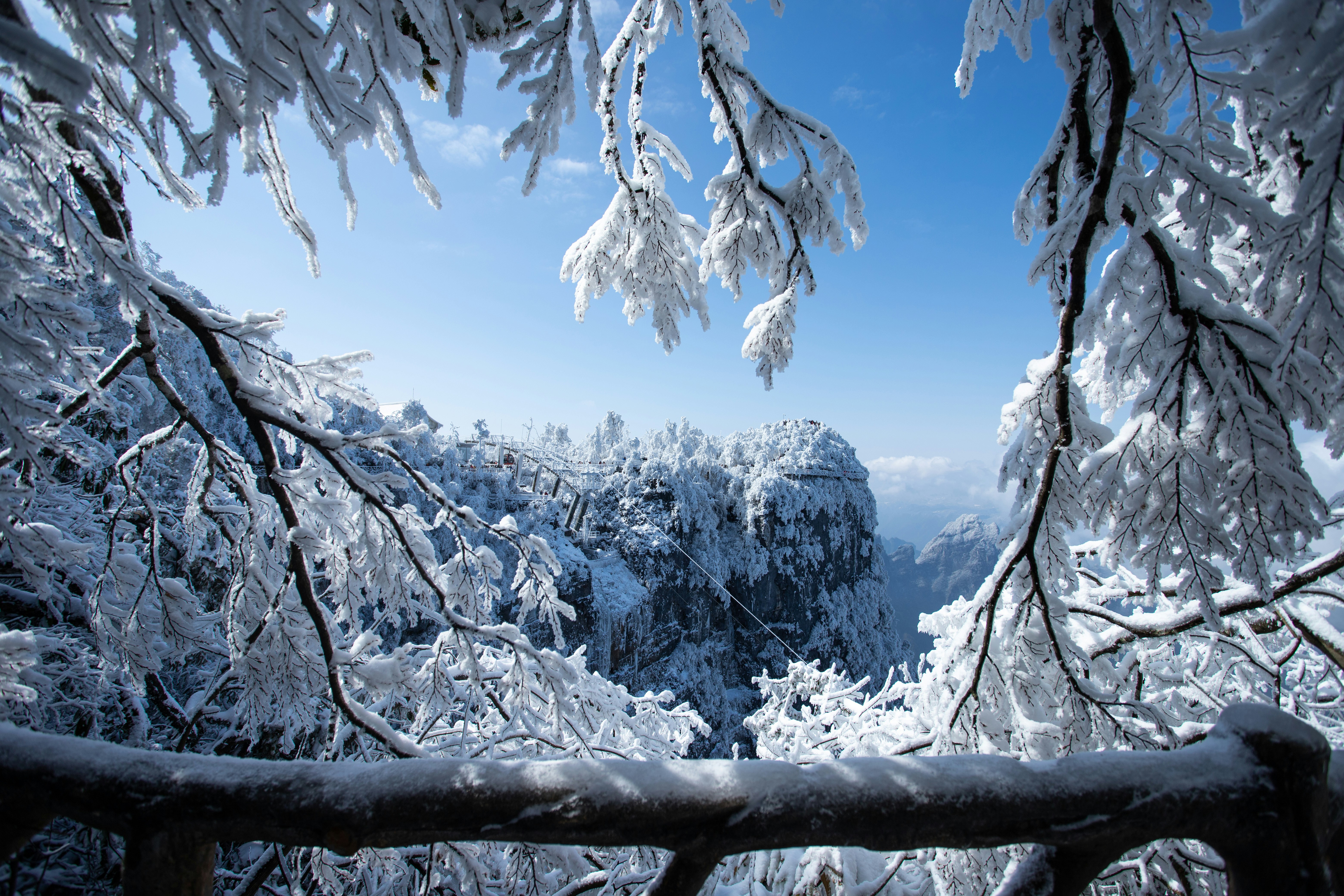 A view of a snowy mountain from a balcony photo – Free Blue Image on ...