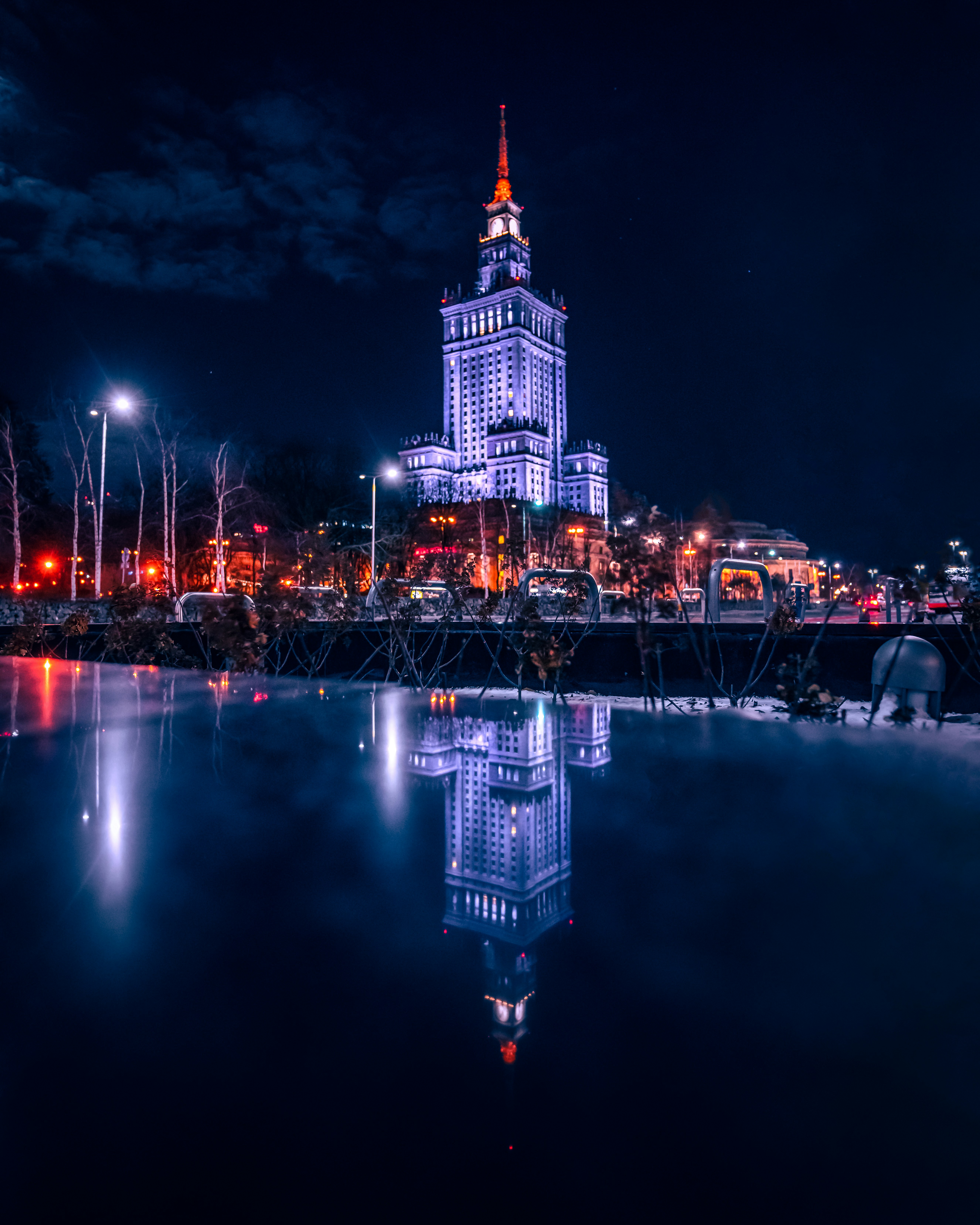 Night Spire Over Neon River: Warsaw’s Palace of Culture in Quiet Glow