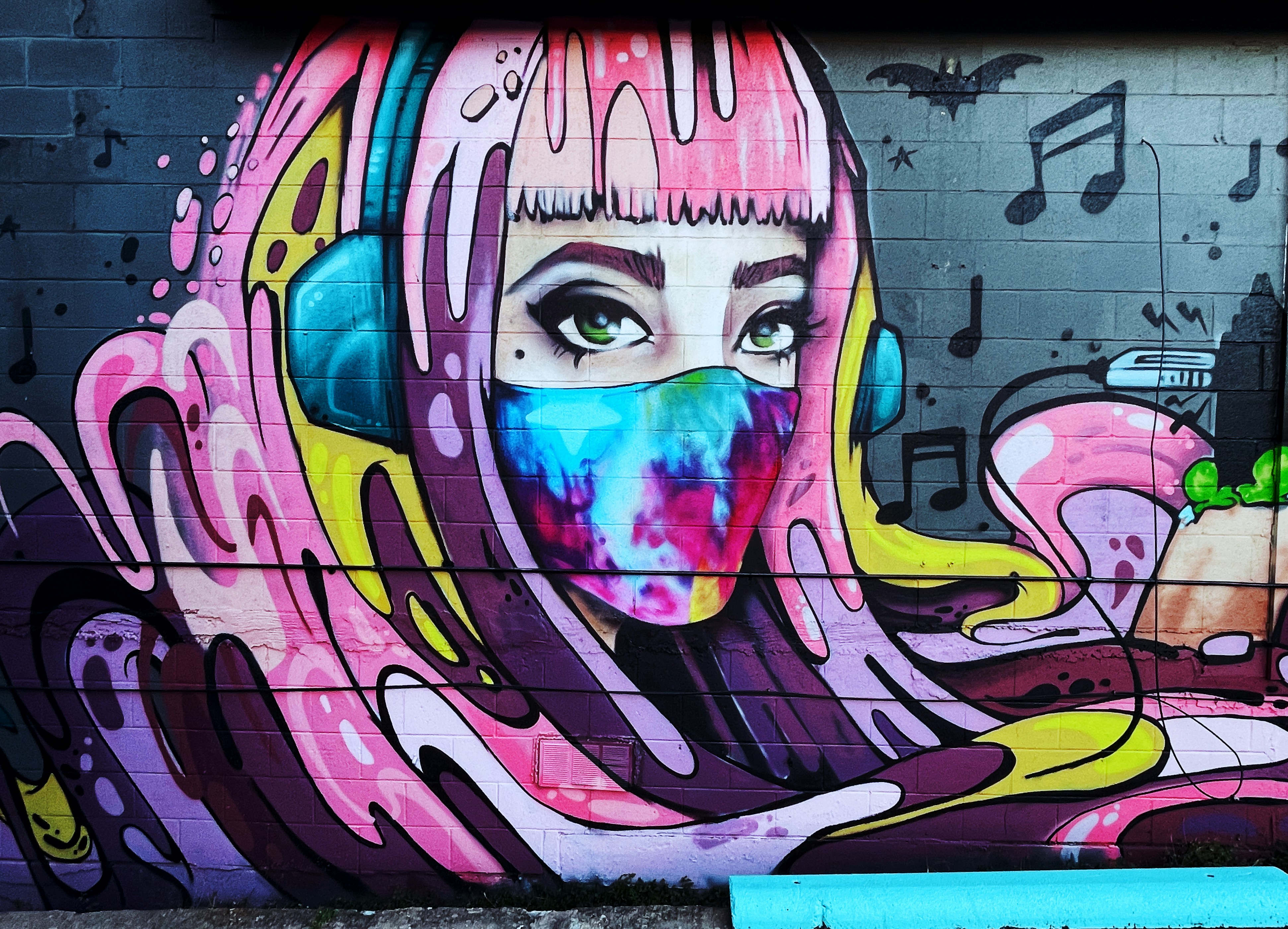 Neon Mirage: Pink-Haired Graffiti Portrait with Cyan Mask and Headphones