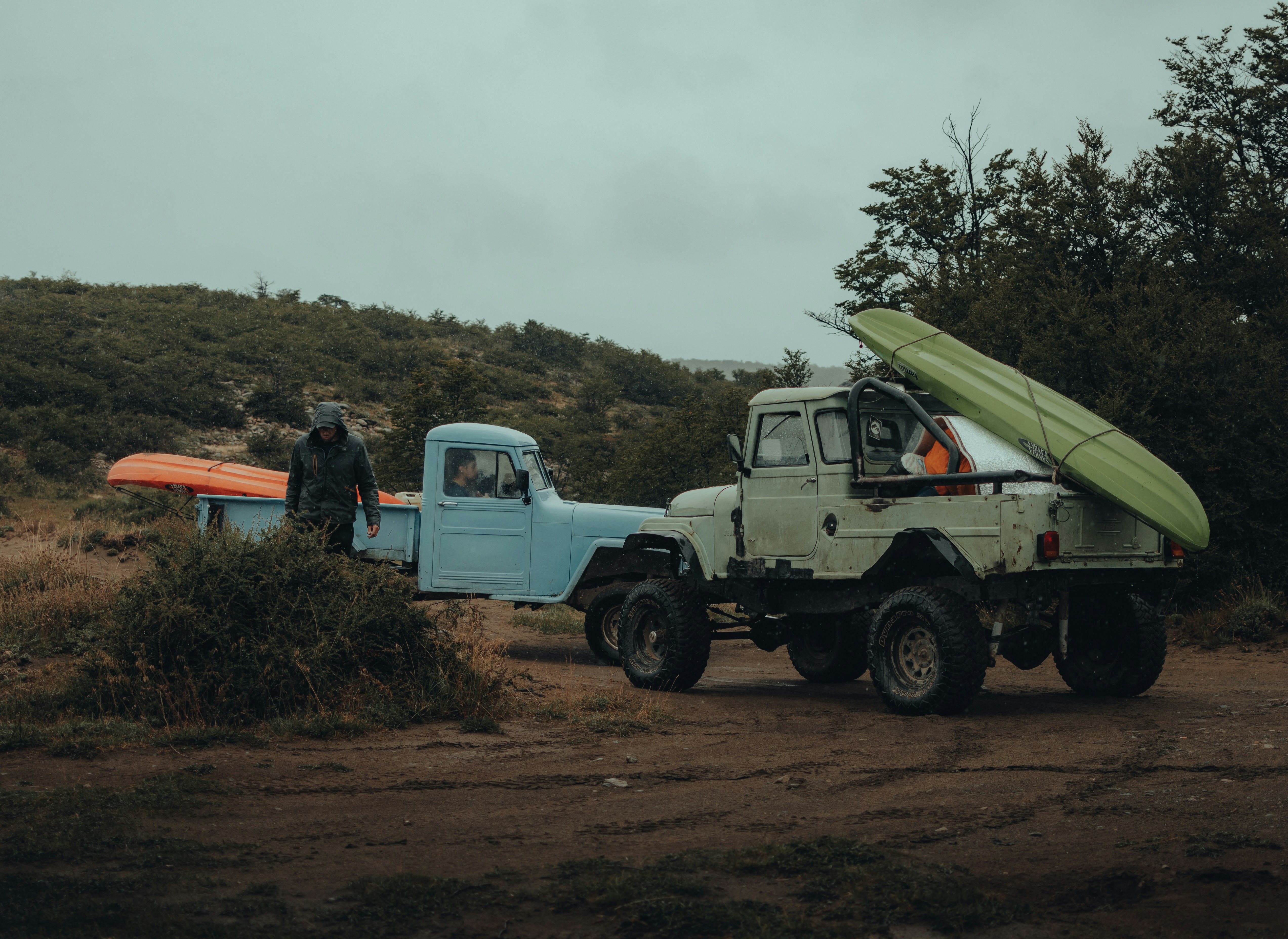 Dune Road Standstill: Vintage Trucks and a Kayak Under Grey Skies