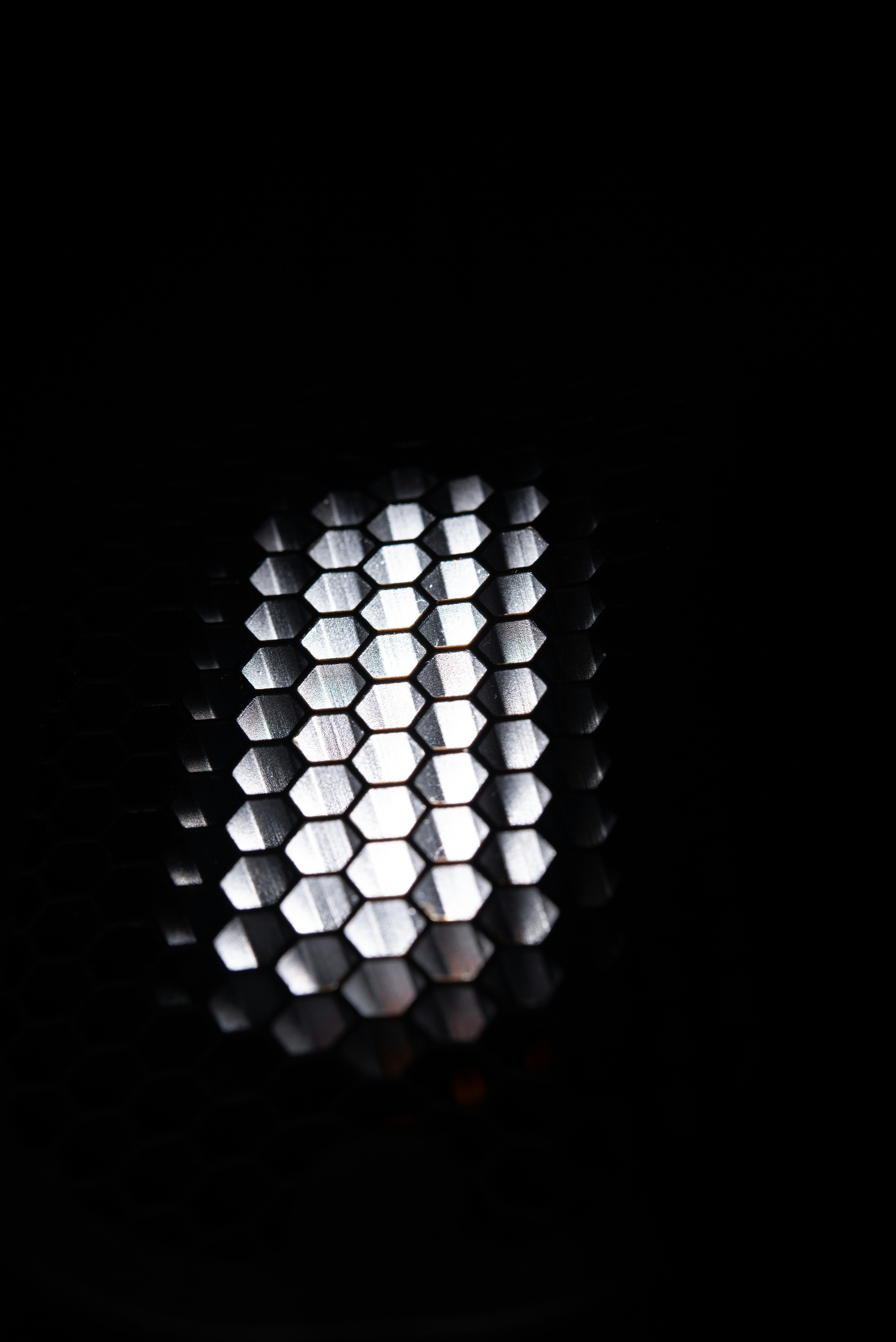 Hexagonal Halo: Close-up of a Metallic Mesh Core
