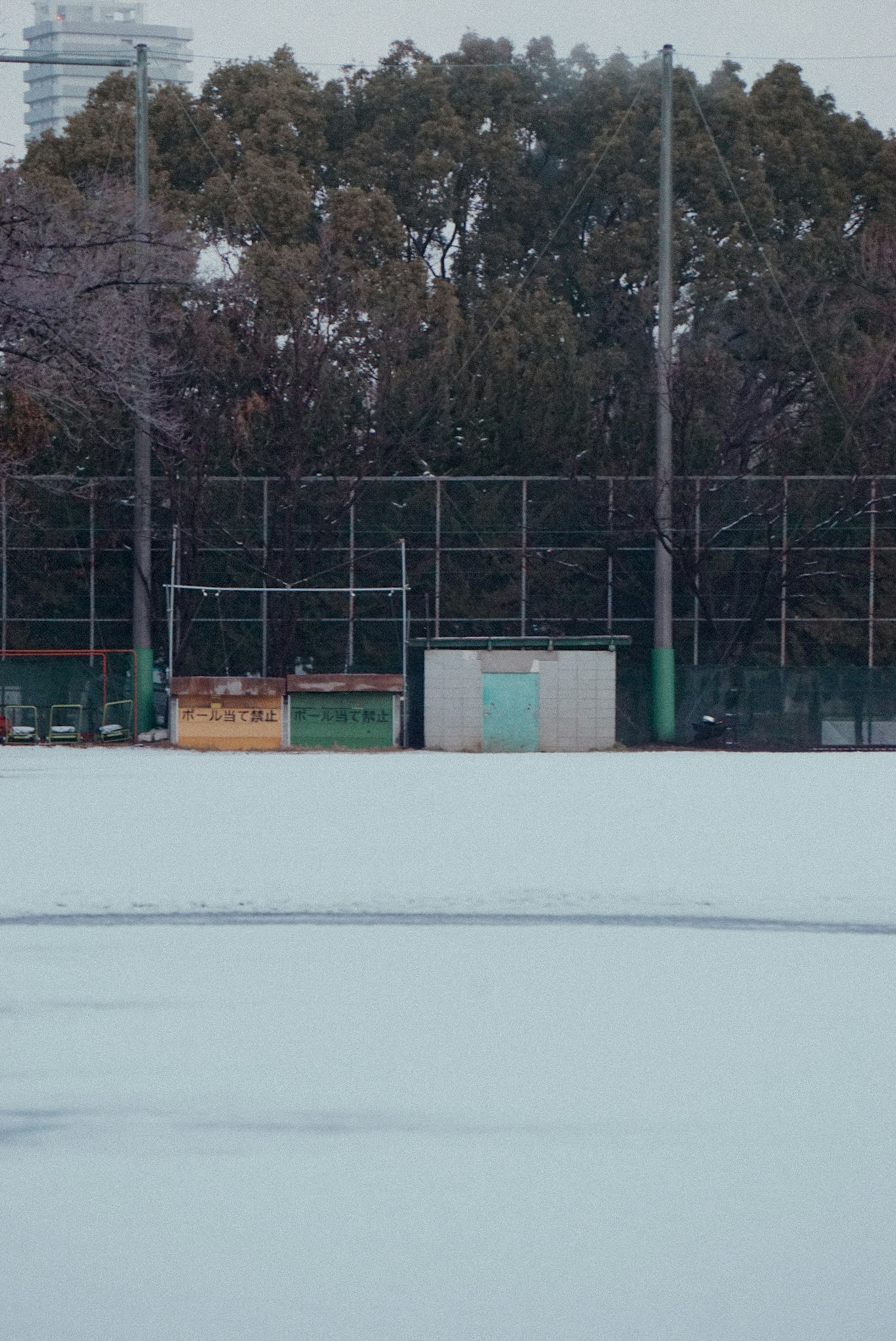 Baseball field covered in snow