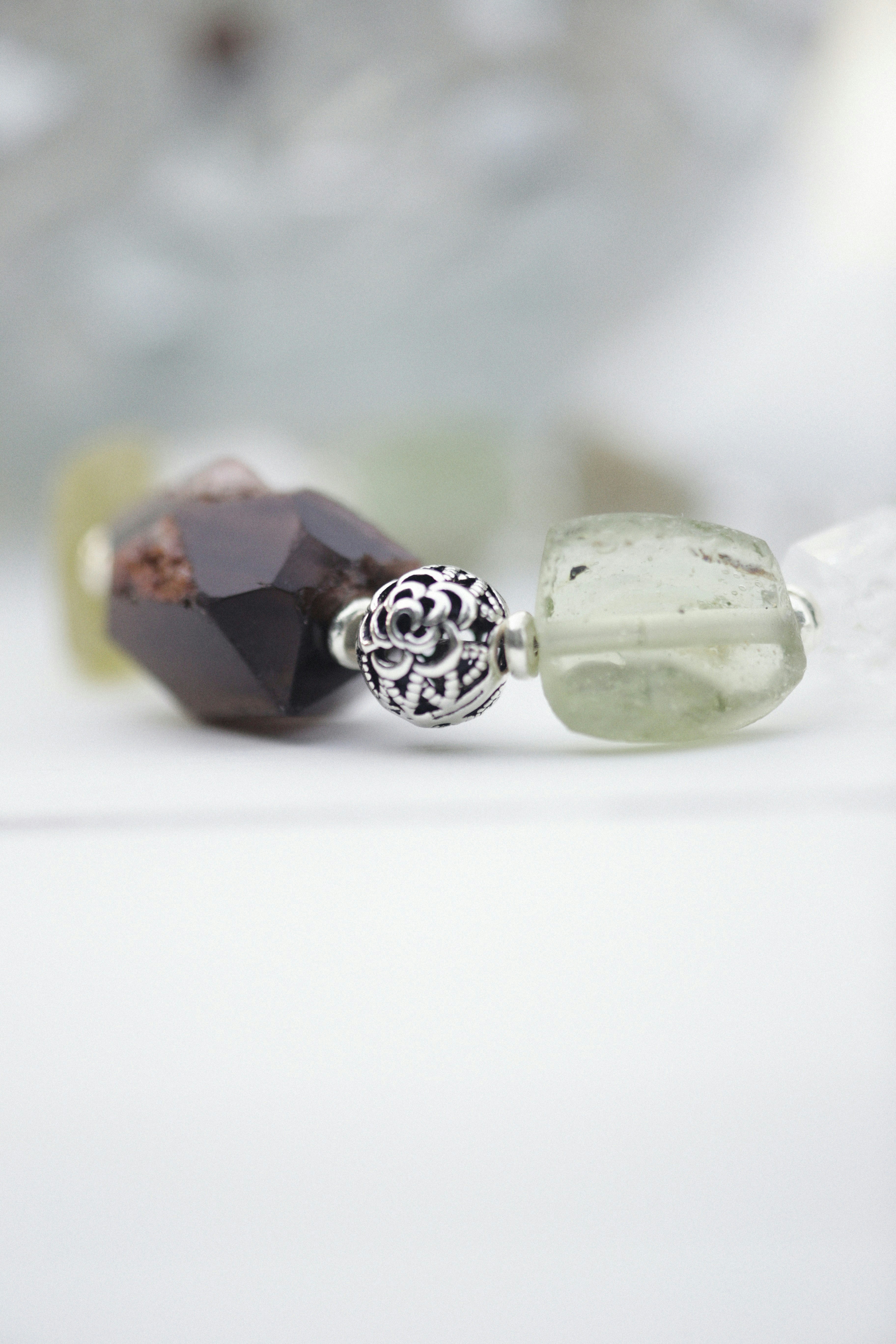 A close up of two beads on a white surface photo – Free Accessories ...