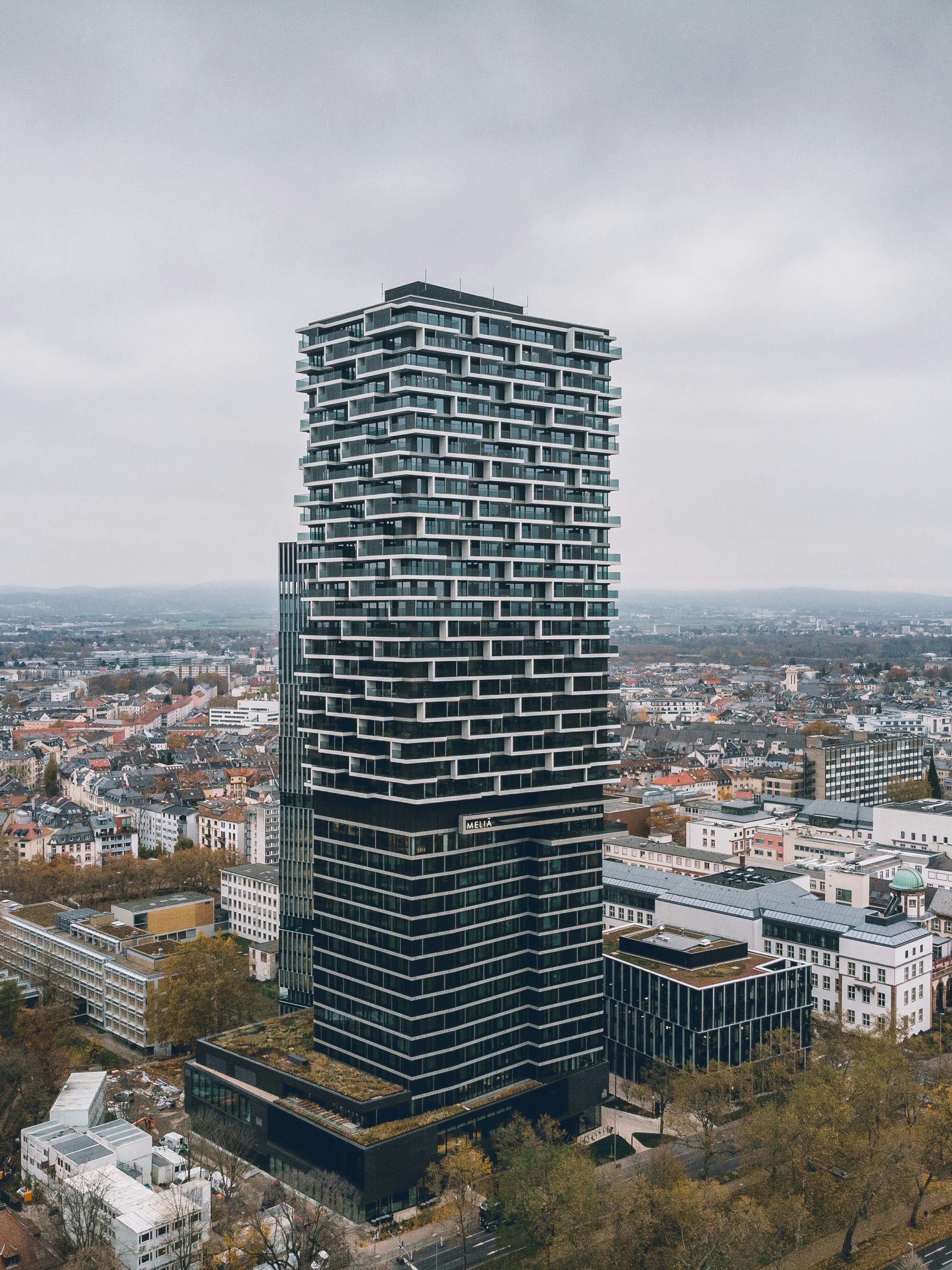 An aerial view of a tall building in a city photo – Free Germania Image ...