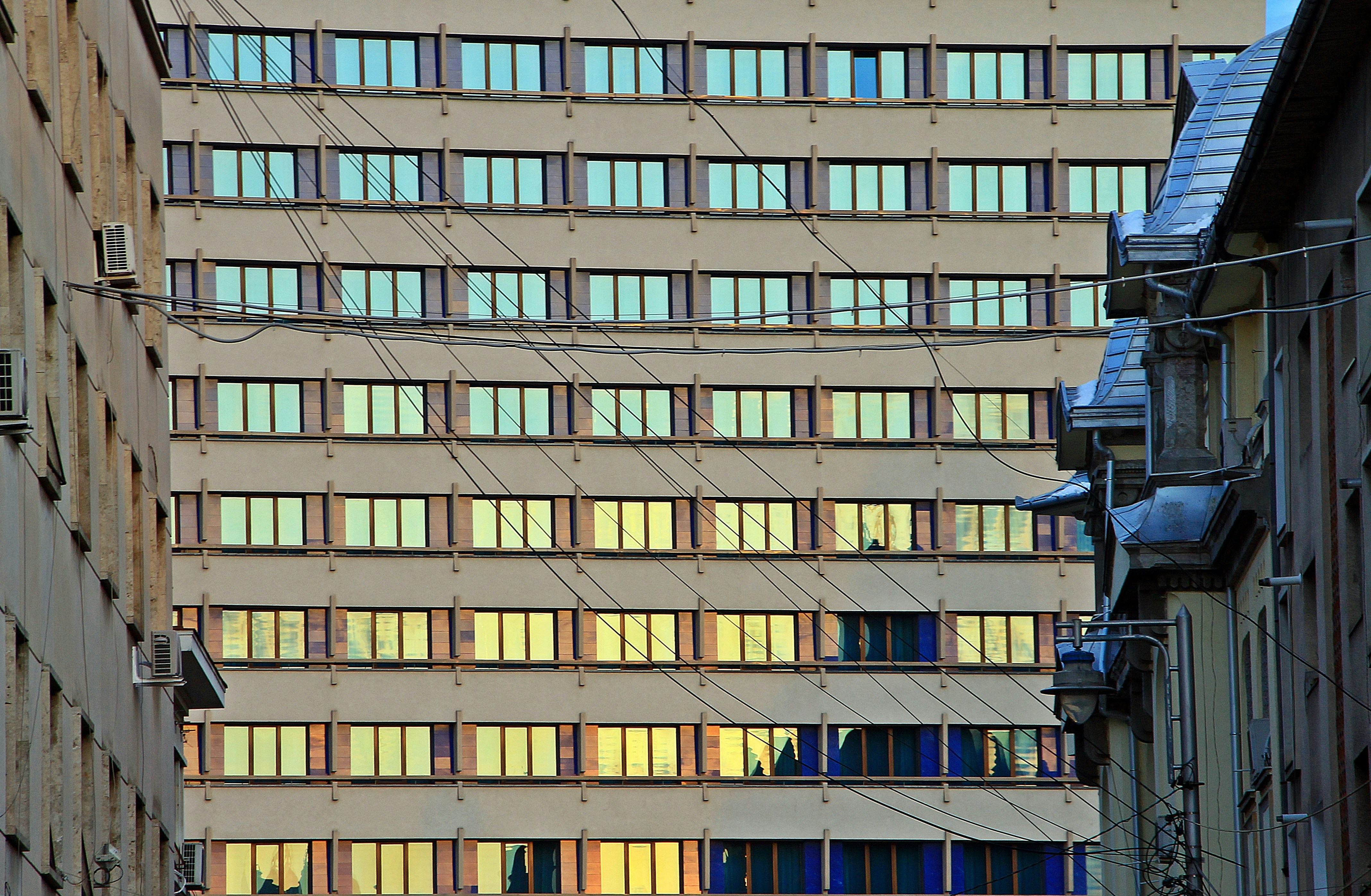 Symphony of Reflections: Urban Sunset