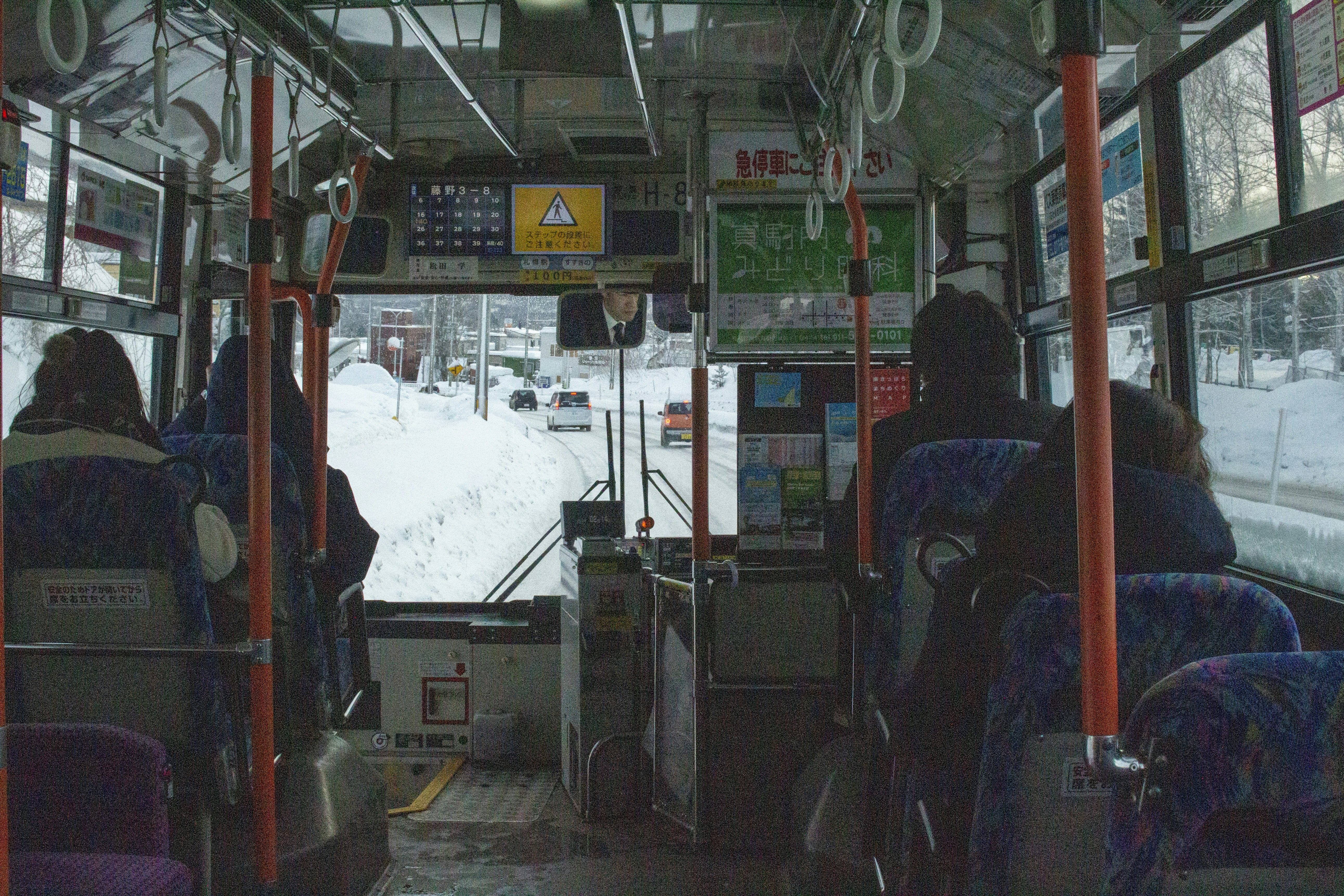 Frosted Window Forward: A Snowbound City Bus Ride
