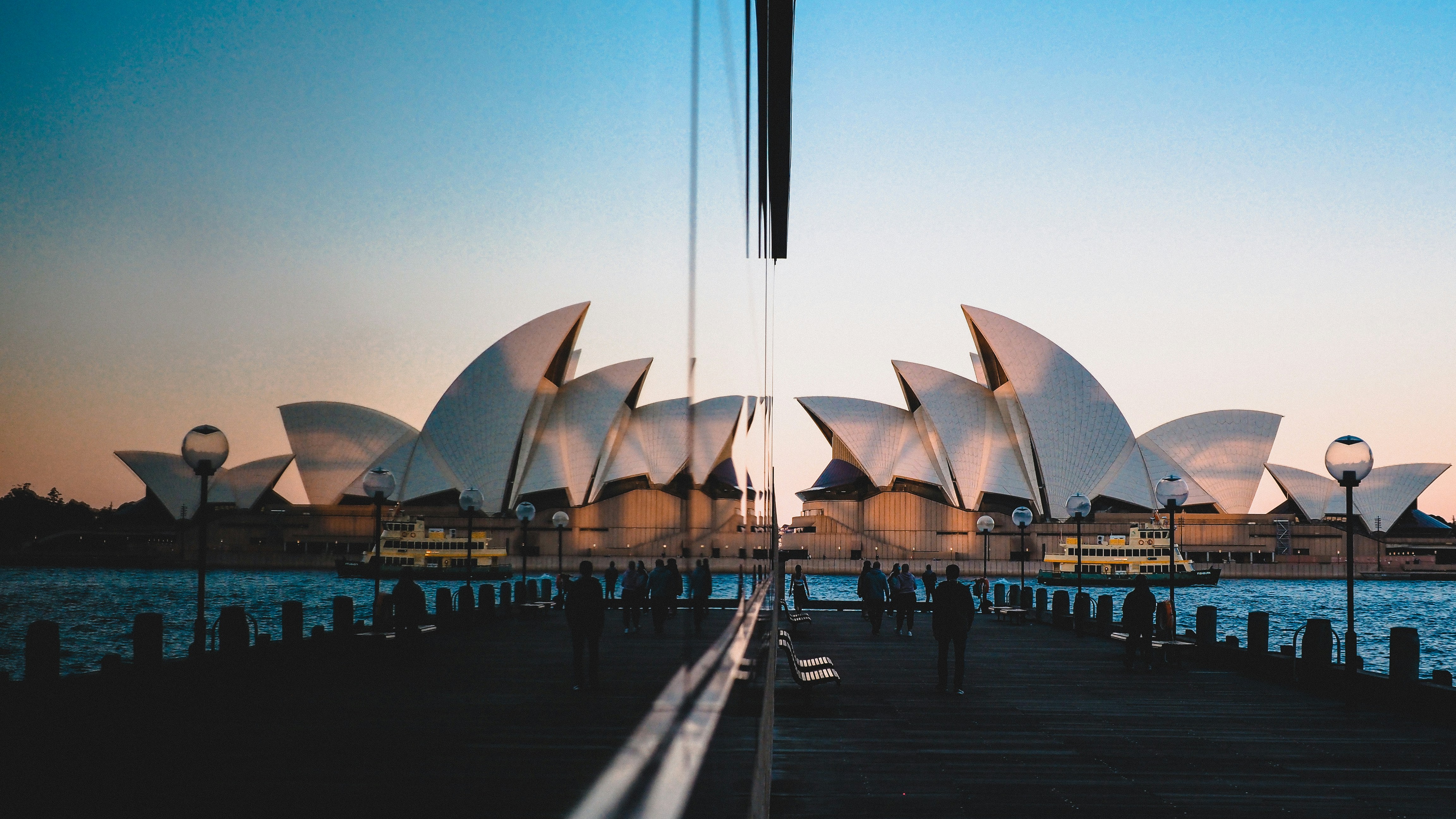 A view of the sydney opera house from across the water photo – Free ...