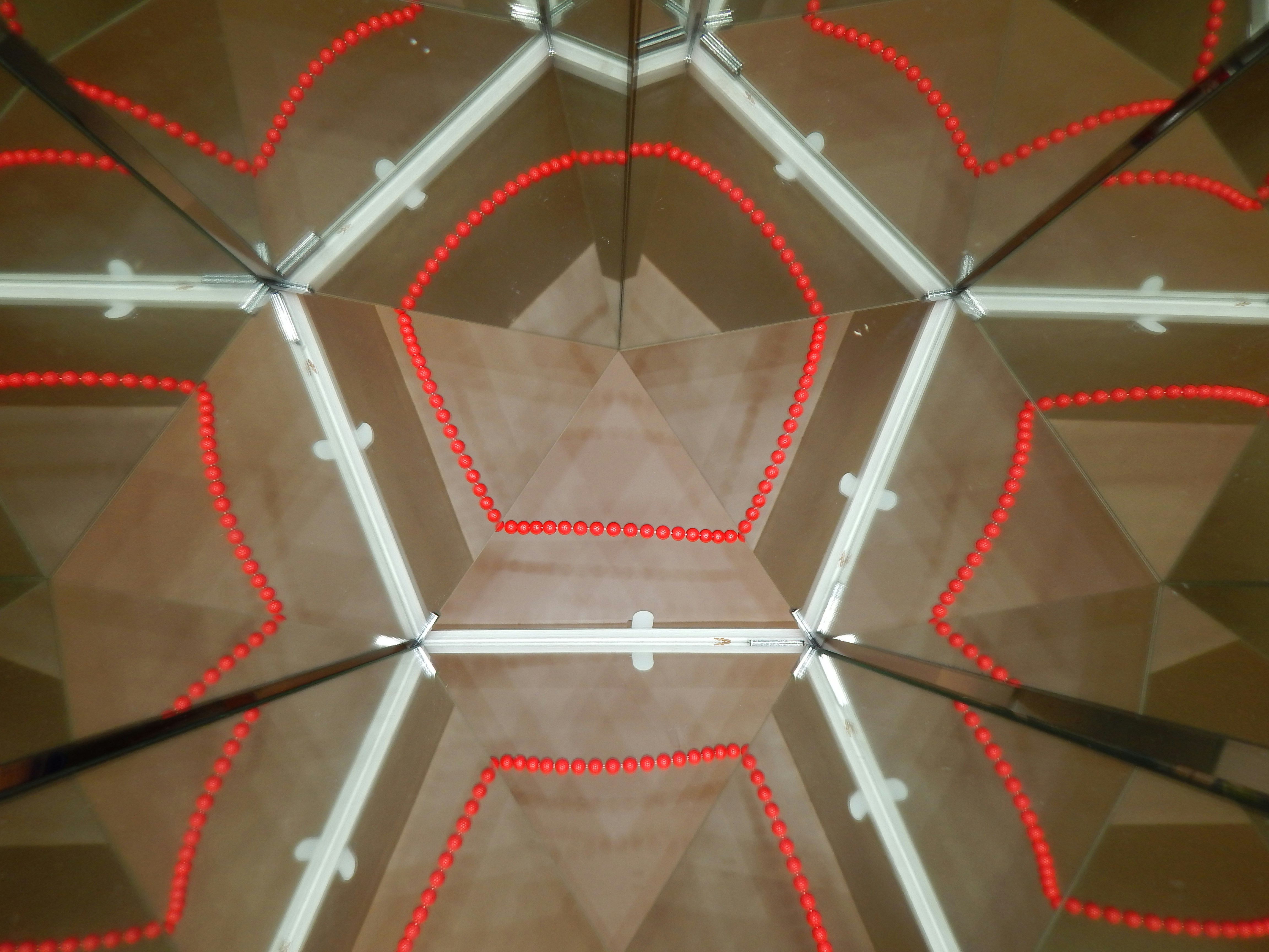 Red-LED Kaleidoscope: Symmetry in a Glass Prism