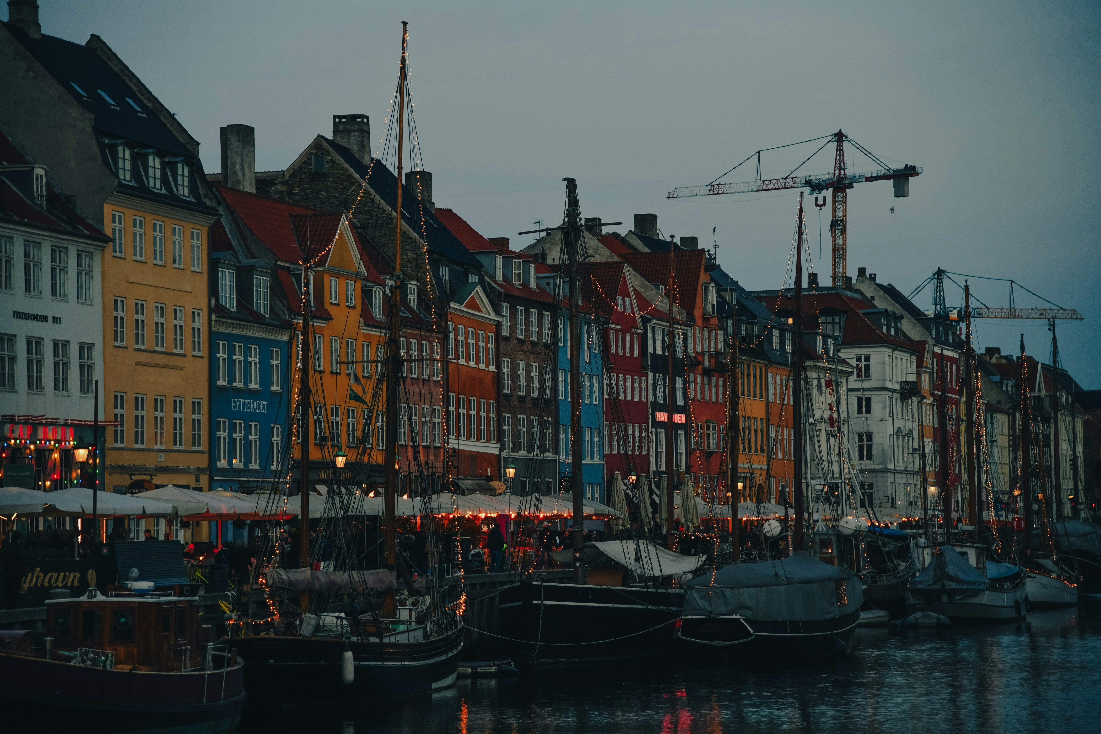 Nyhavn Dusk: Lantern-Warmed Facades Framing a Quiet Harbor