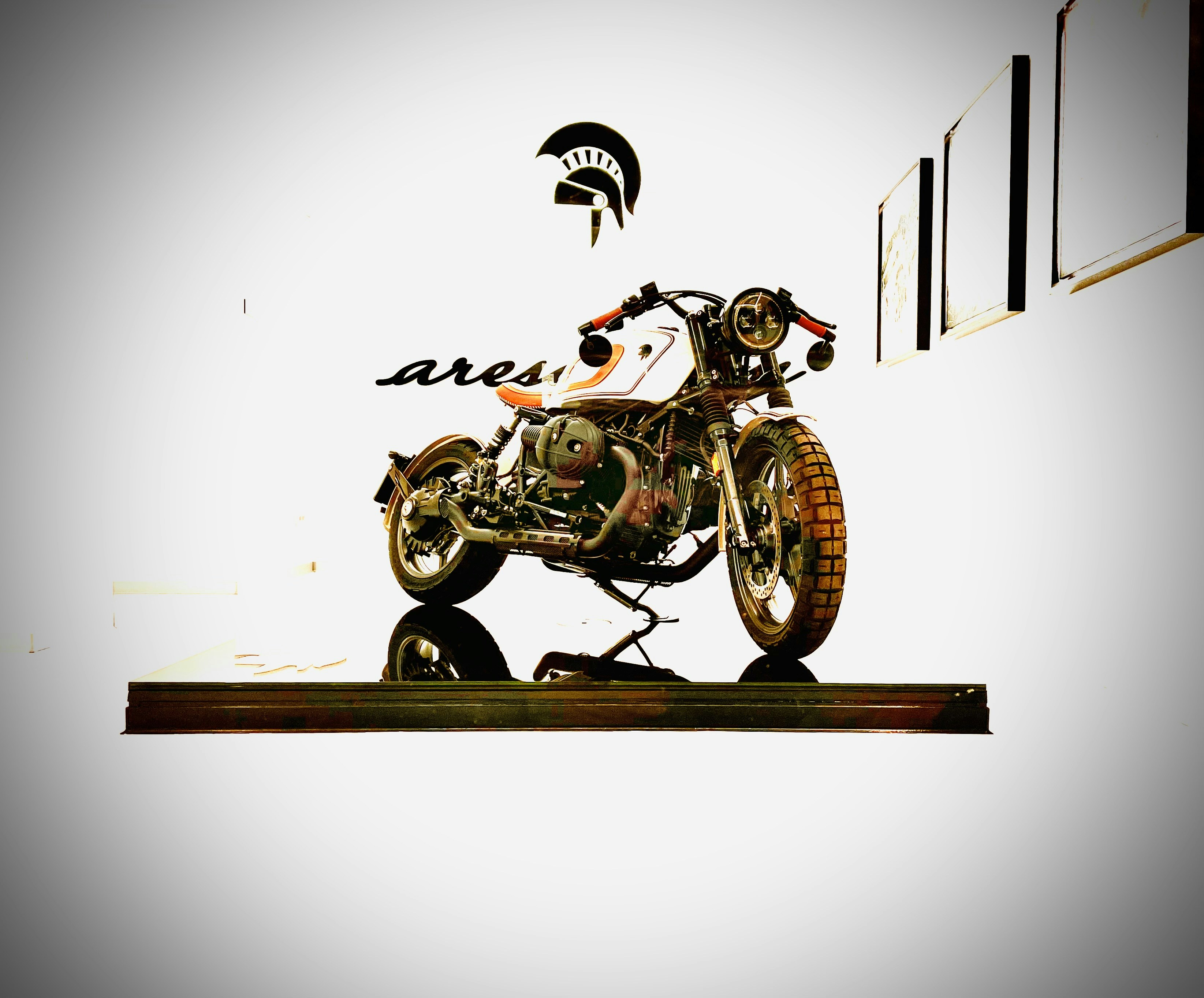 Chrome on Display: A Vintage Racer on a Showroom Pedestal