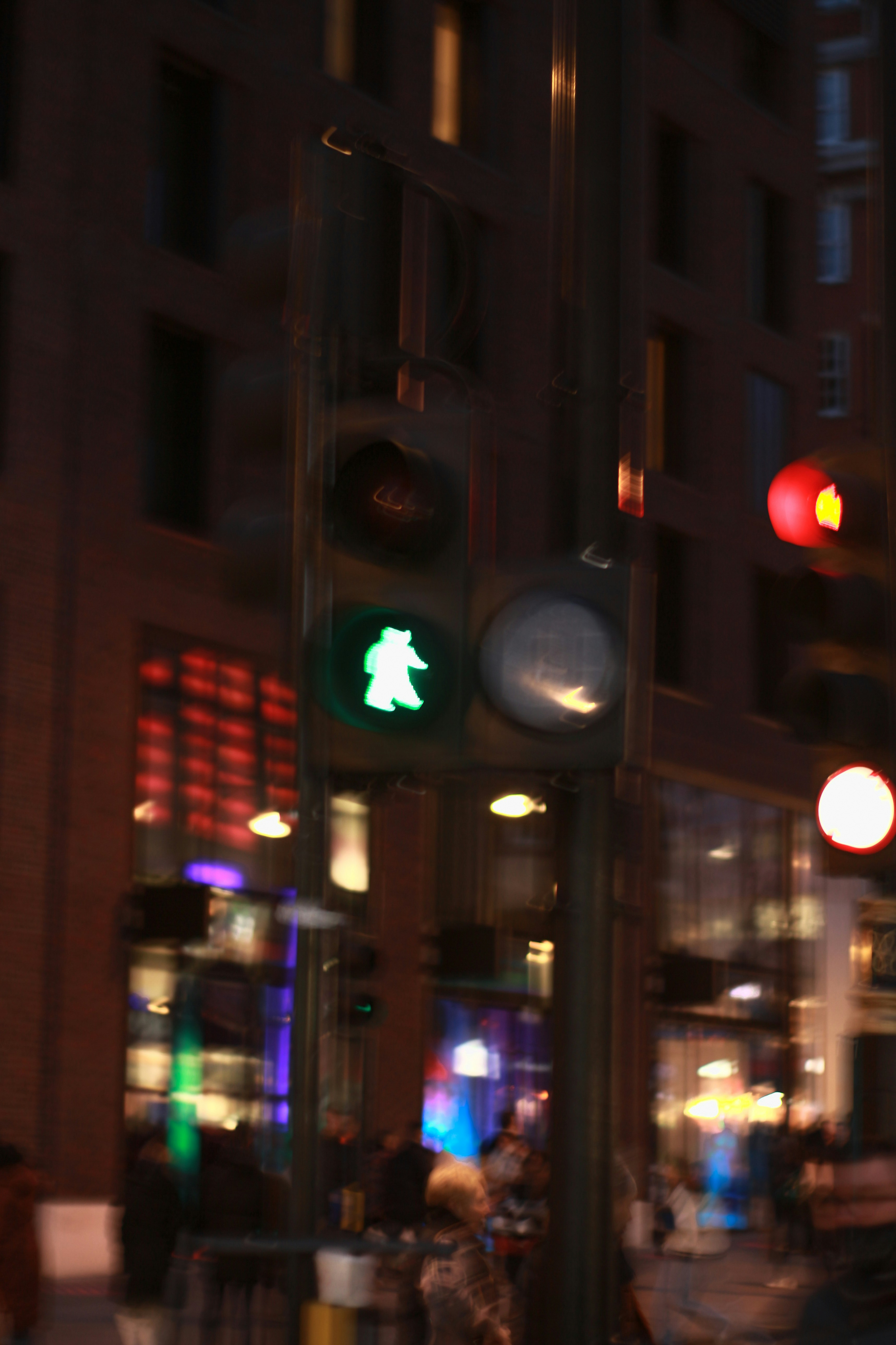 a traffic light sitting on the side of a road
