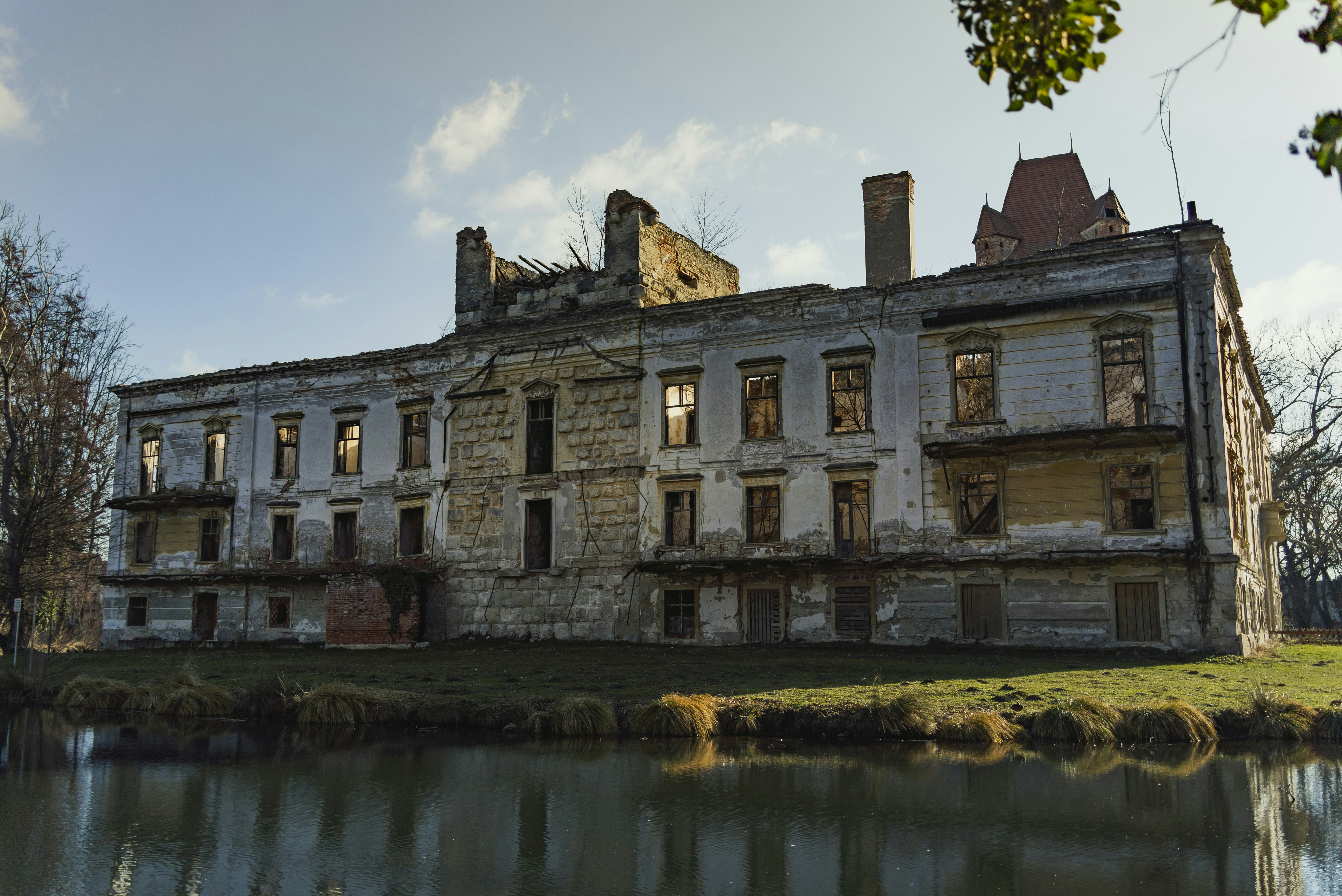 Riverside Ruins: A Silent Estate Reflecting Time