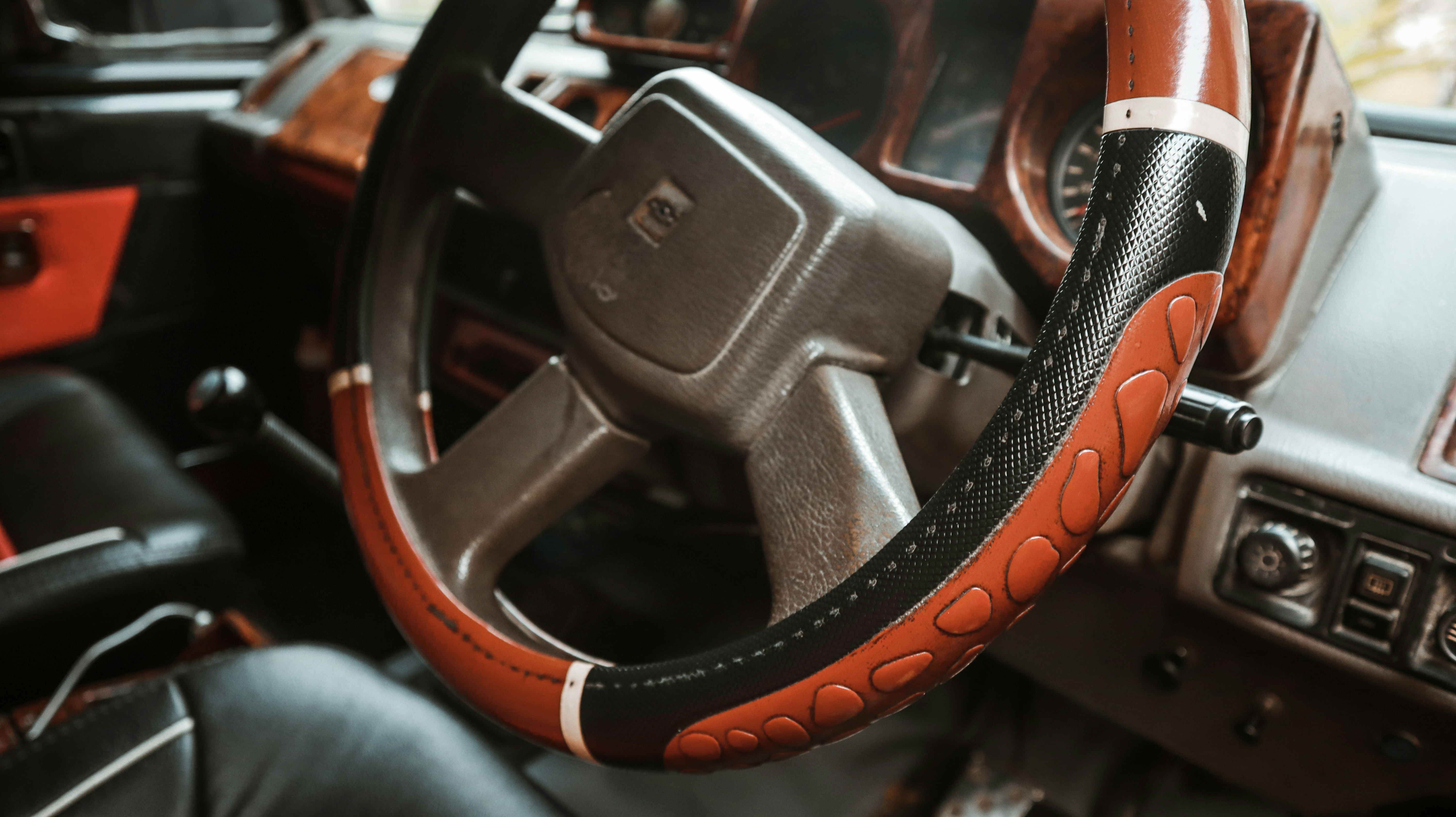 a close up of a steering wheel on a car