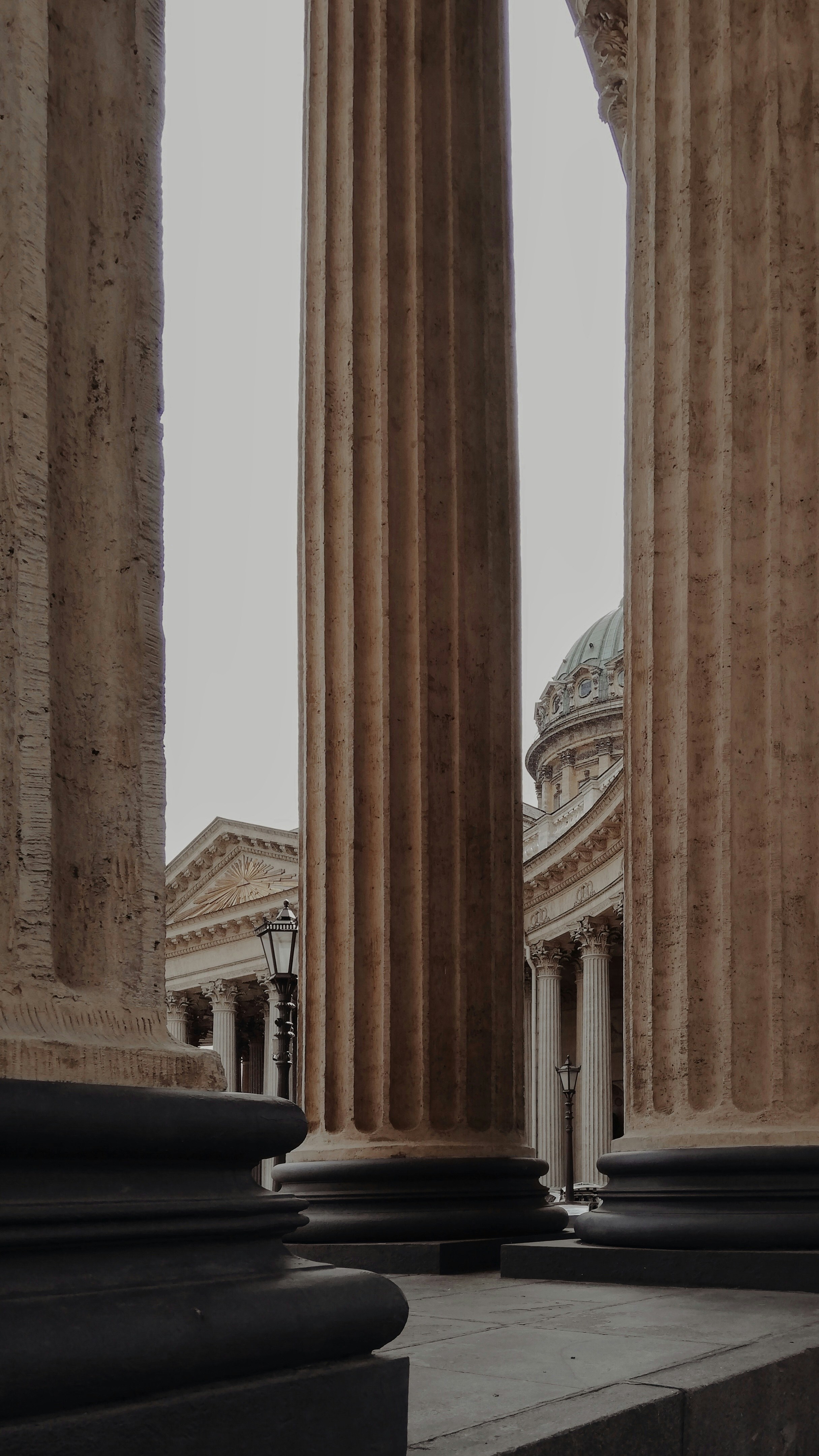 A couple of columns sitting next to each other photo – Free Building ...