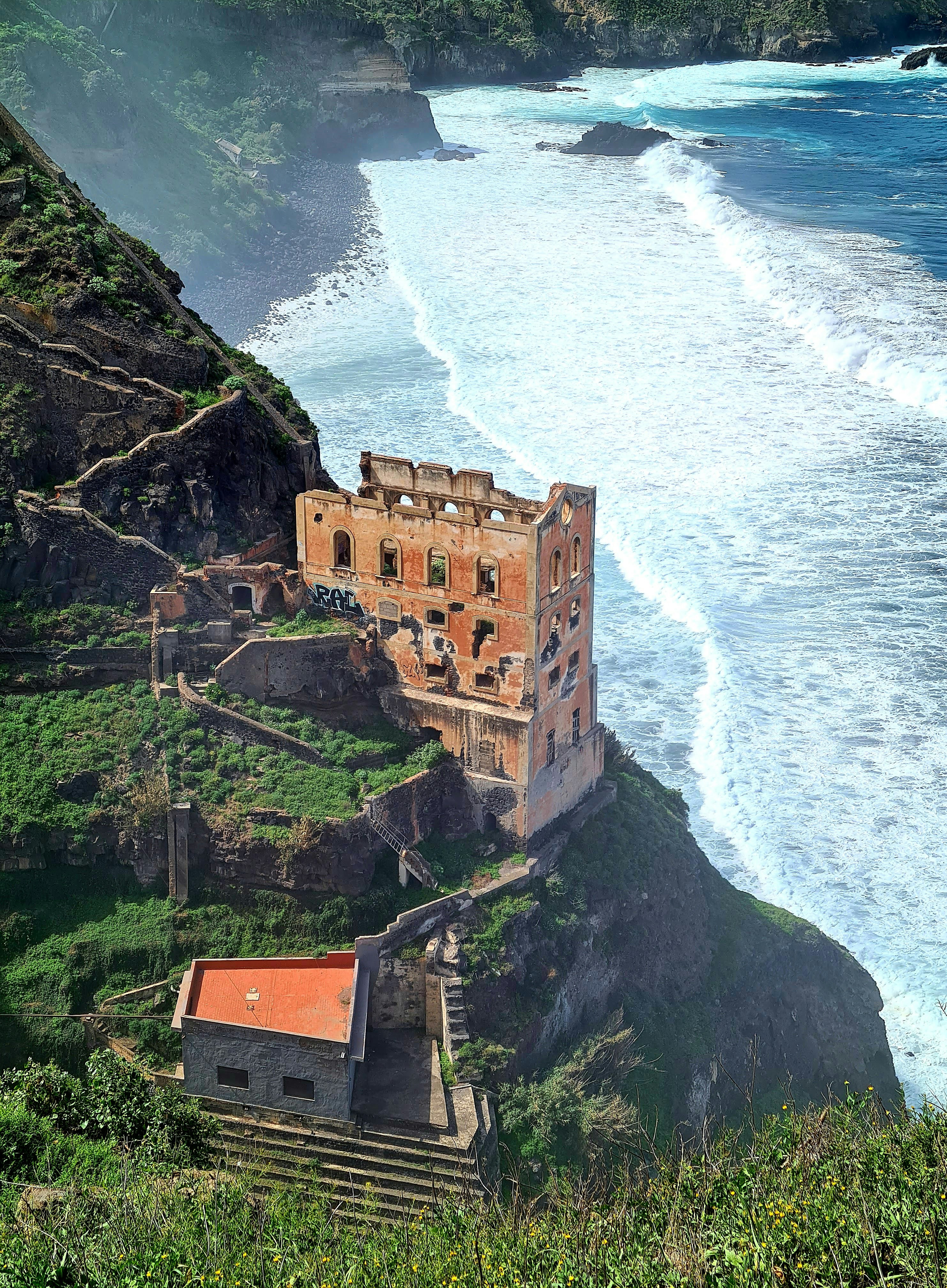 Cliffside Brick Ruin Overlooking a Roaring Coast