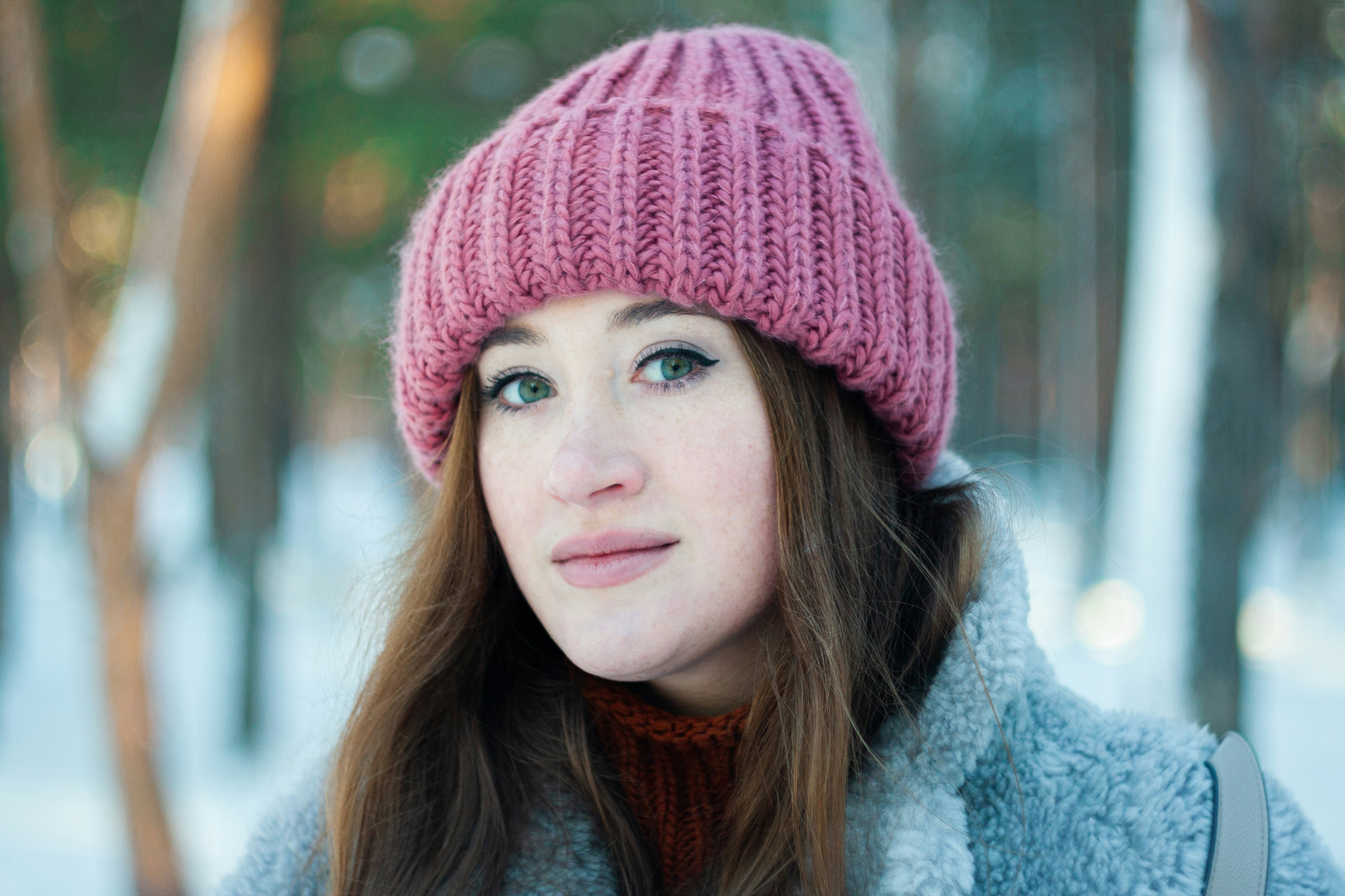 A woman wearing a pink hat in the snow photo – Free Apparel Image on ...
