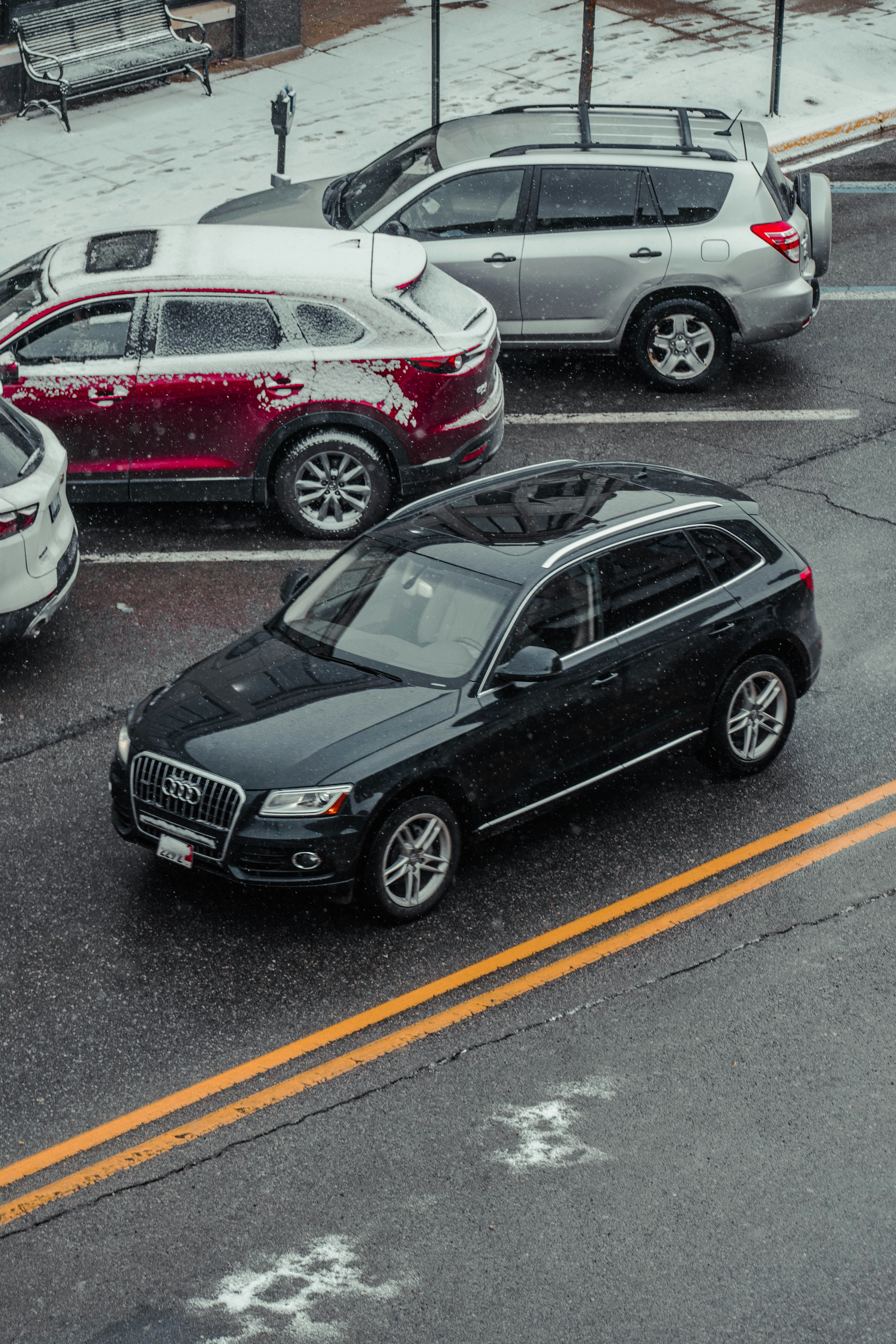 A bunch of cars that are parked in the street photo – Free Tire Image ...
