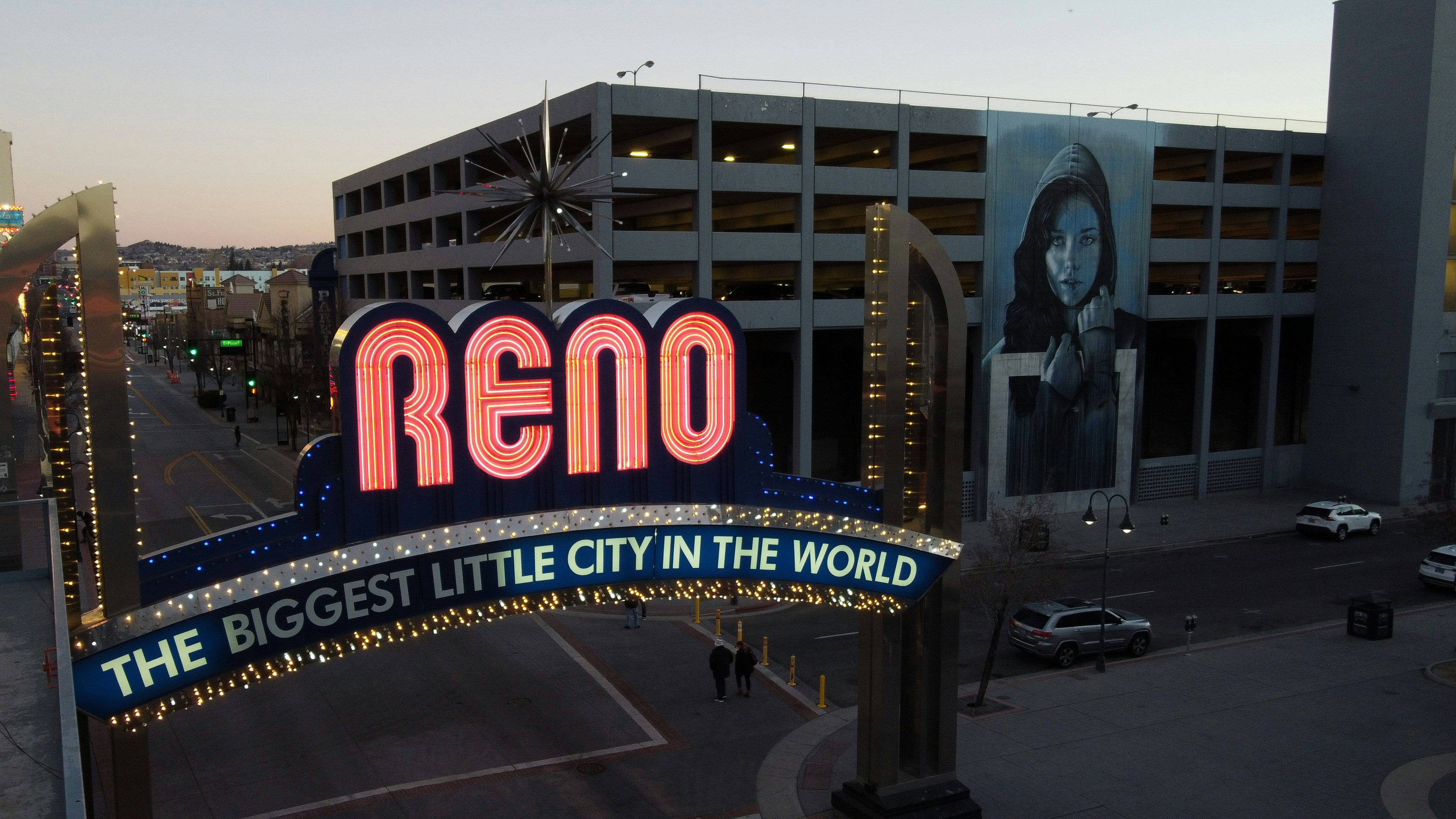 A neon sign that reads reno the biggest little city in the world photo ...