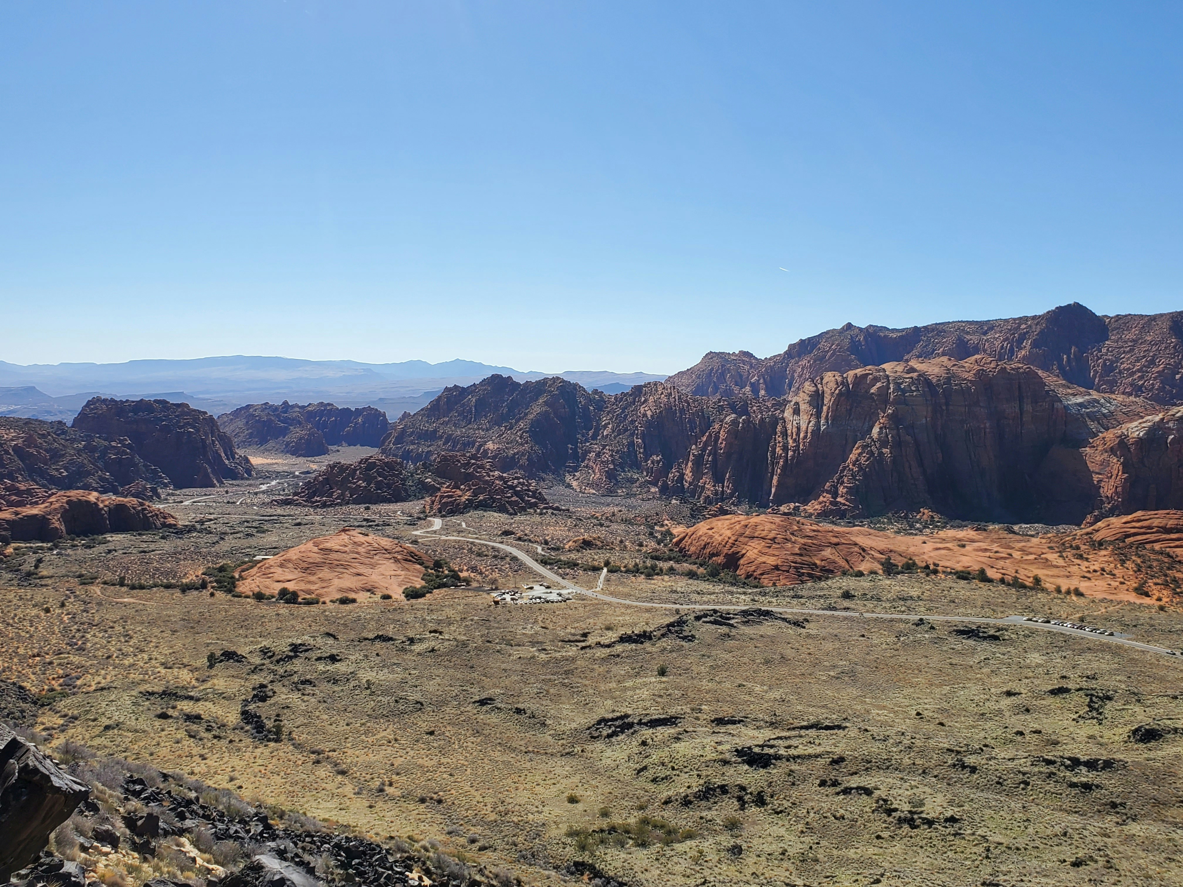 Crimson Ridge Overlook: A Winding Road Through Desert Cliffs