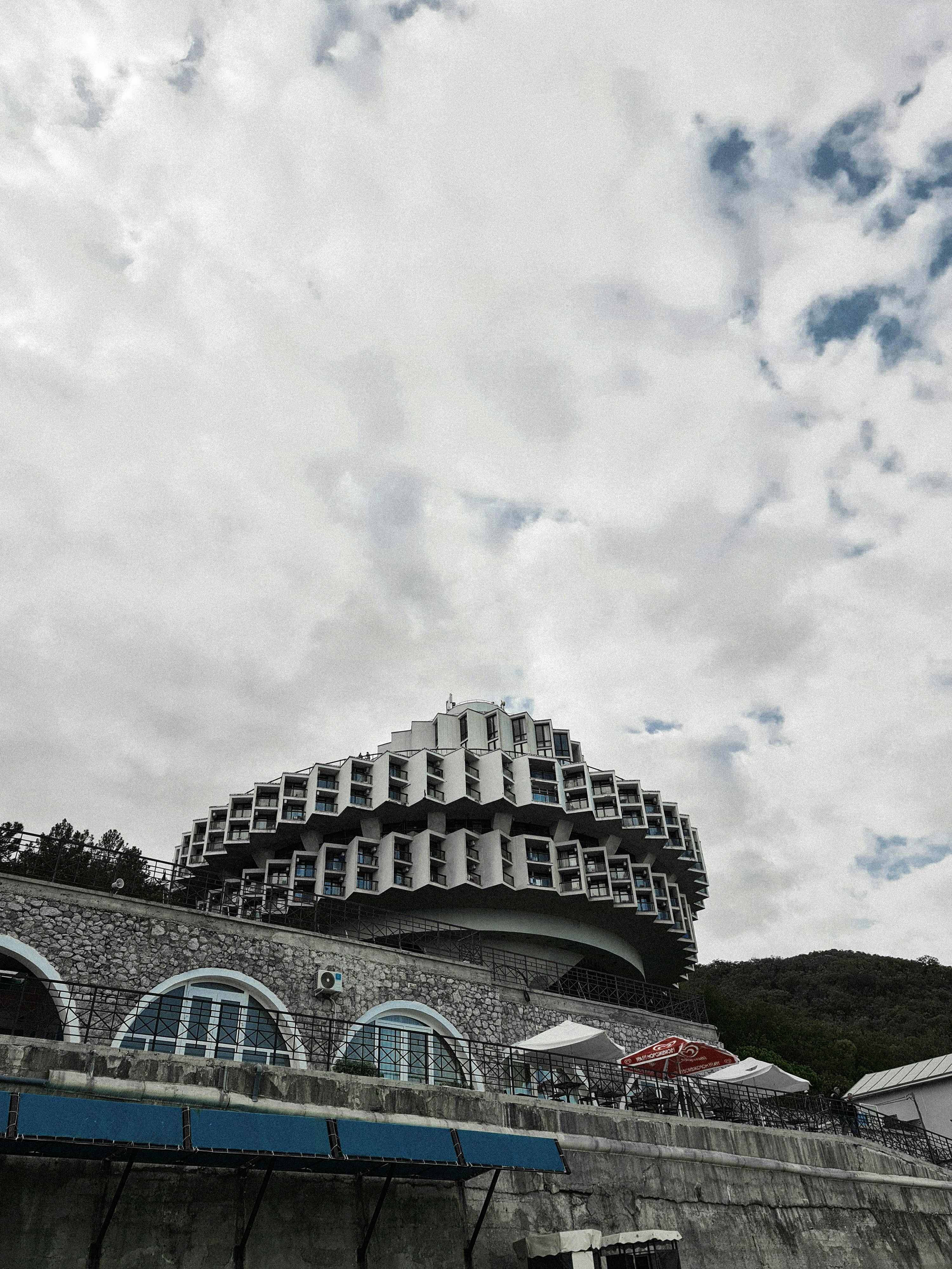 a building that looks like it is made of concrete