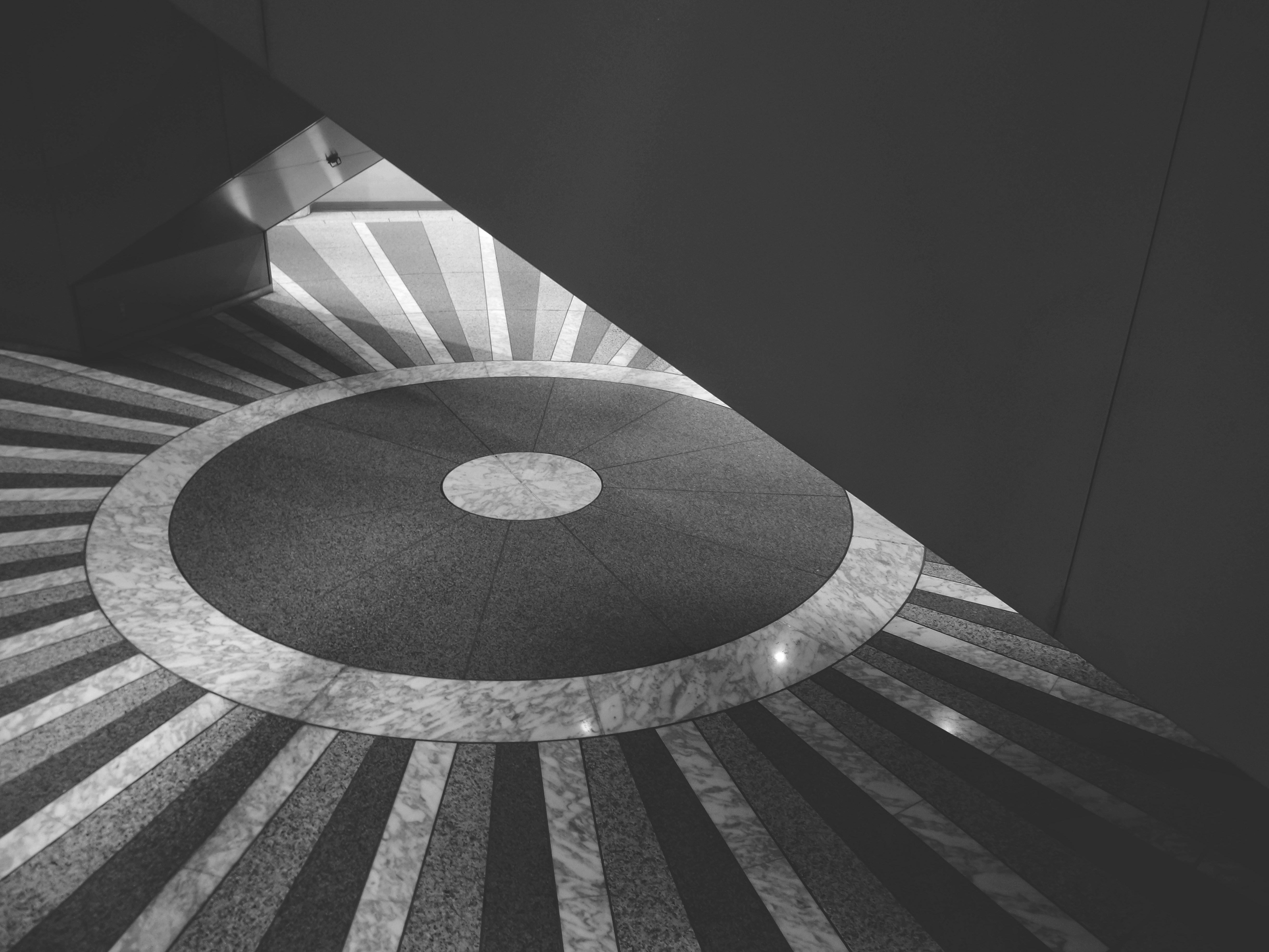 Spiral Courtyard Under Angular Monuments